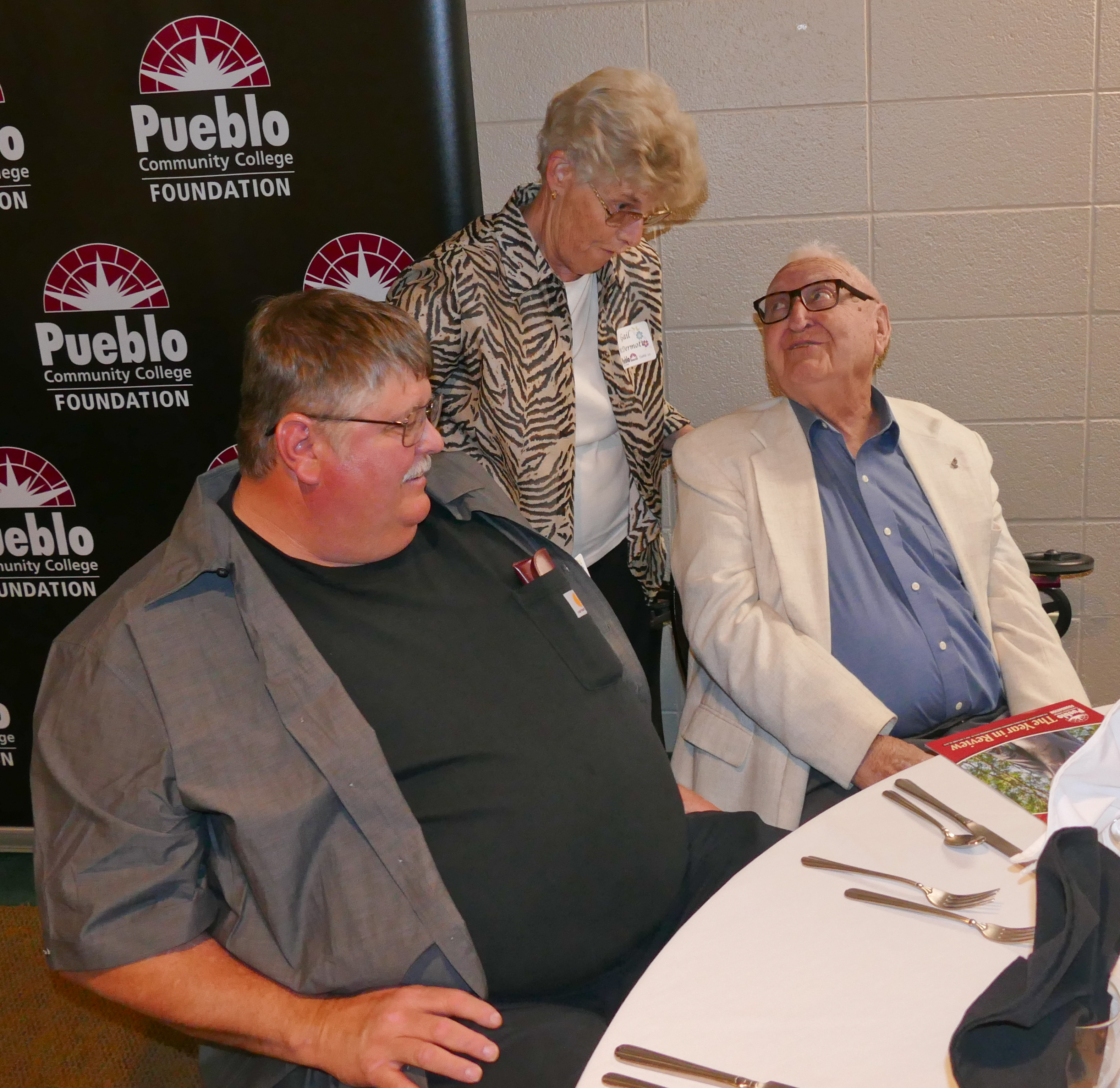 Jon Edwards, left, with Gail McDermott and Don Packard (2009 inductee)