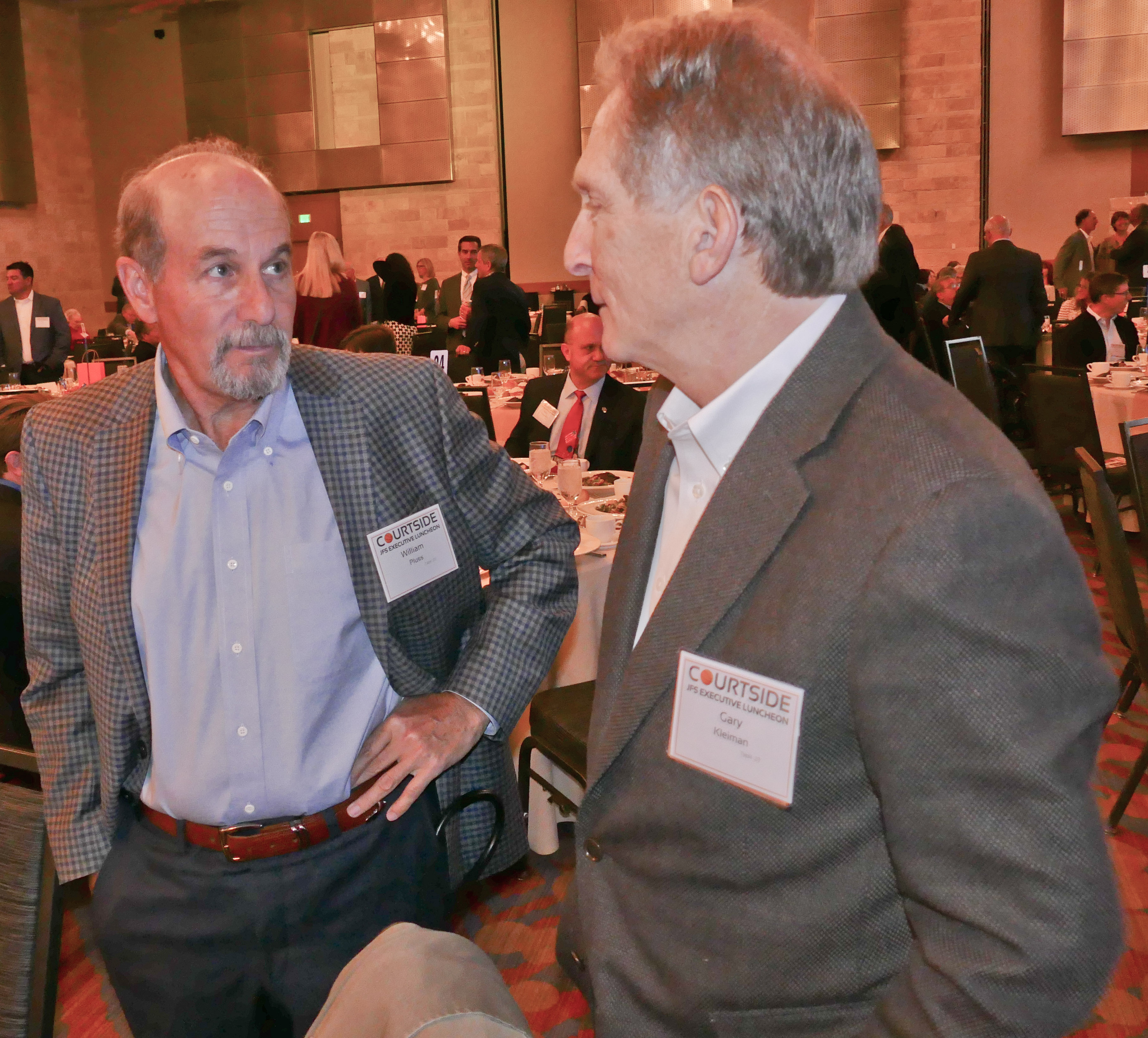 William Pluss, left, chats with Gary Kleiman