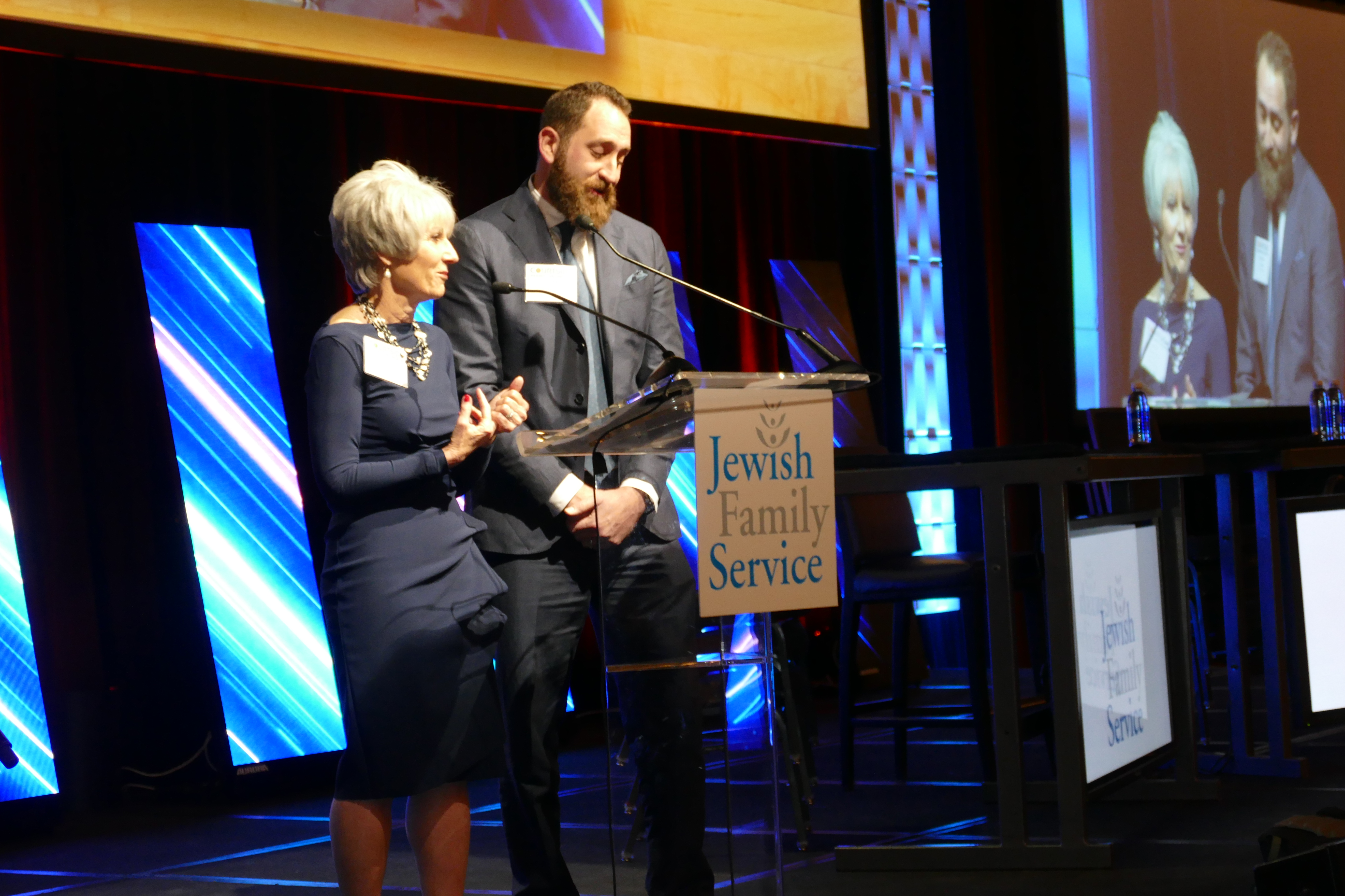 Board Chair Jane E Rosenbaum and Co-Chair Jonathan Alpert on stage