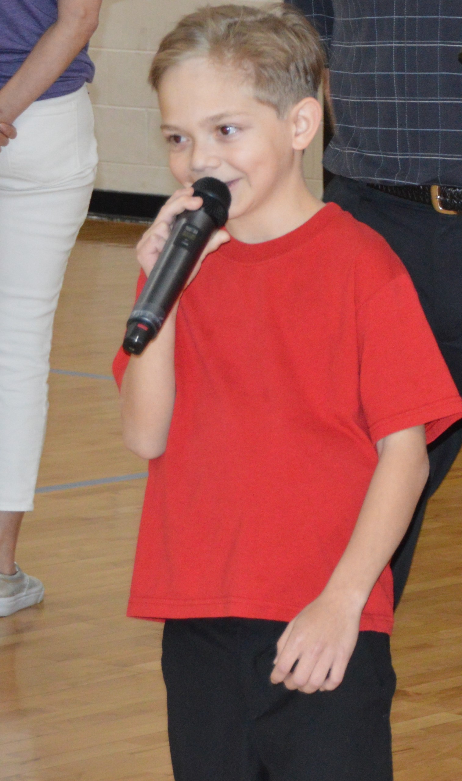 Children's Hospital Colorado ambassador Joseph Wren sings the national ...