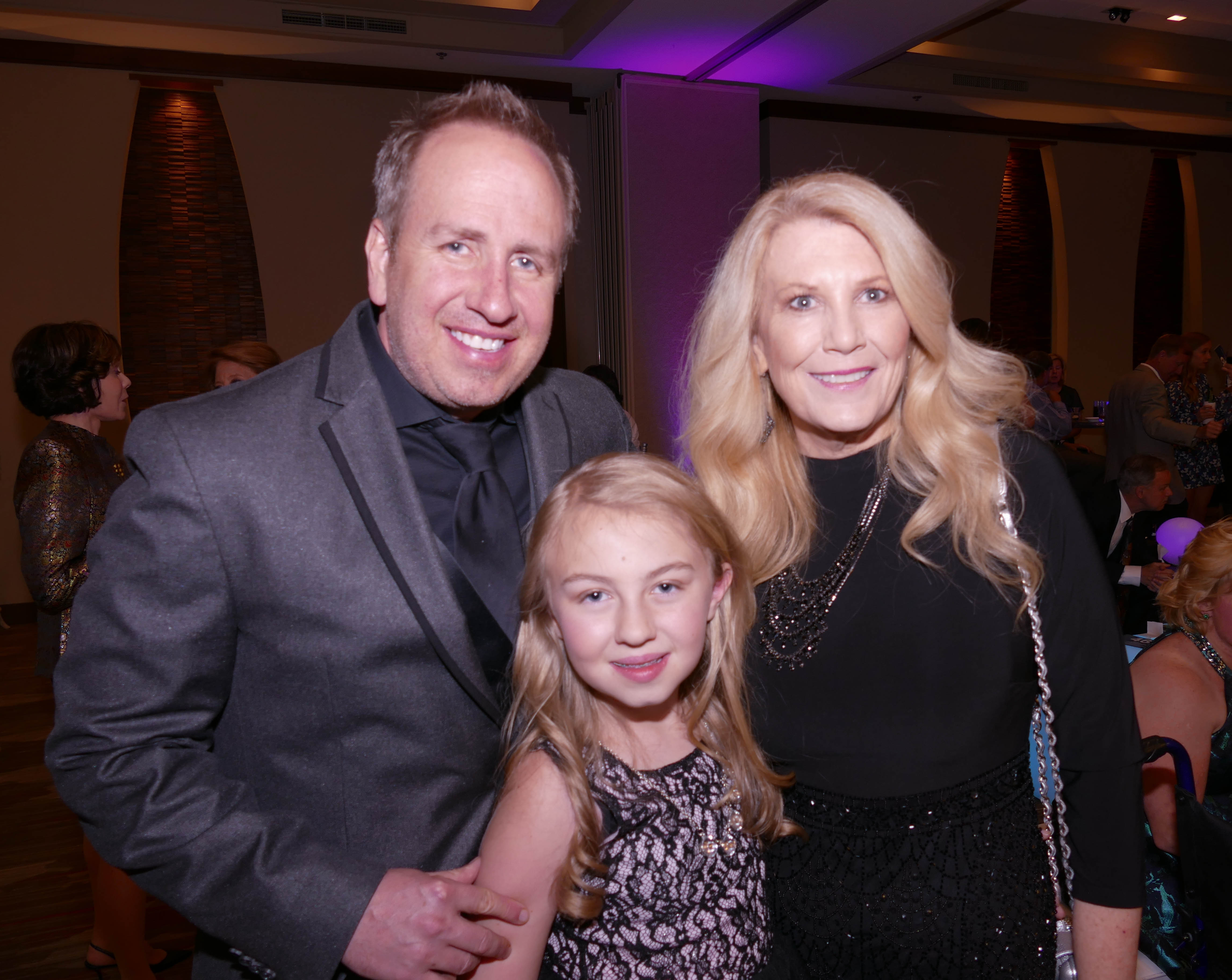 Chris Starkey, who was the emcee for the evening, with his daughter ...