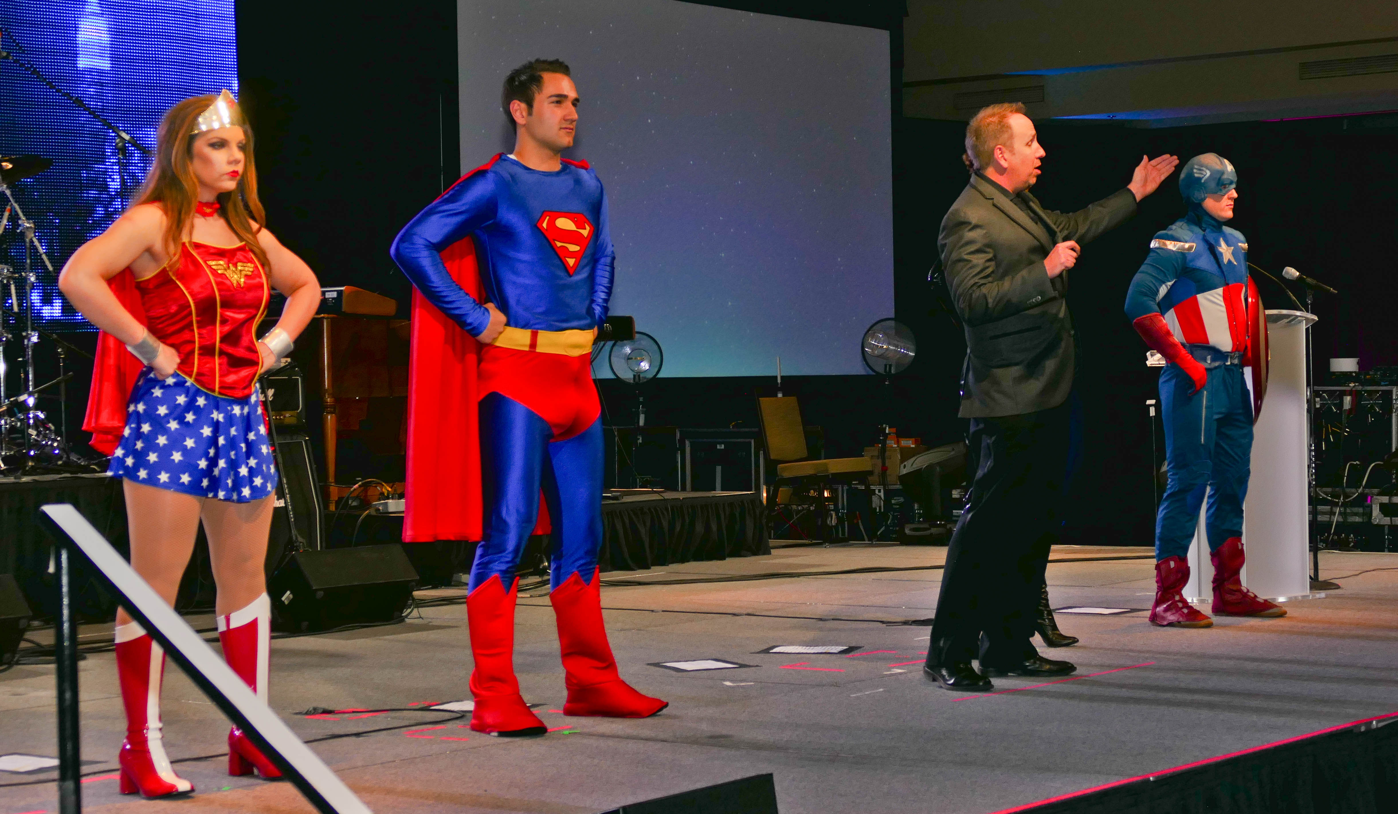 SuperHero icons on stage with Chris Starkey