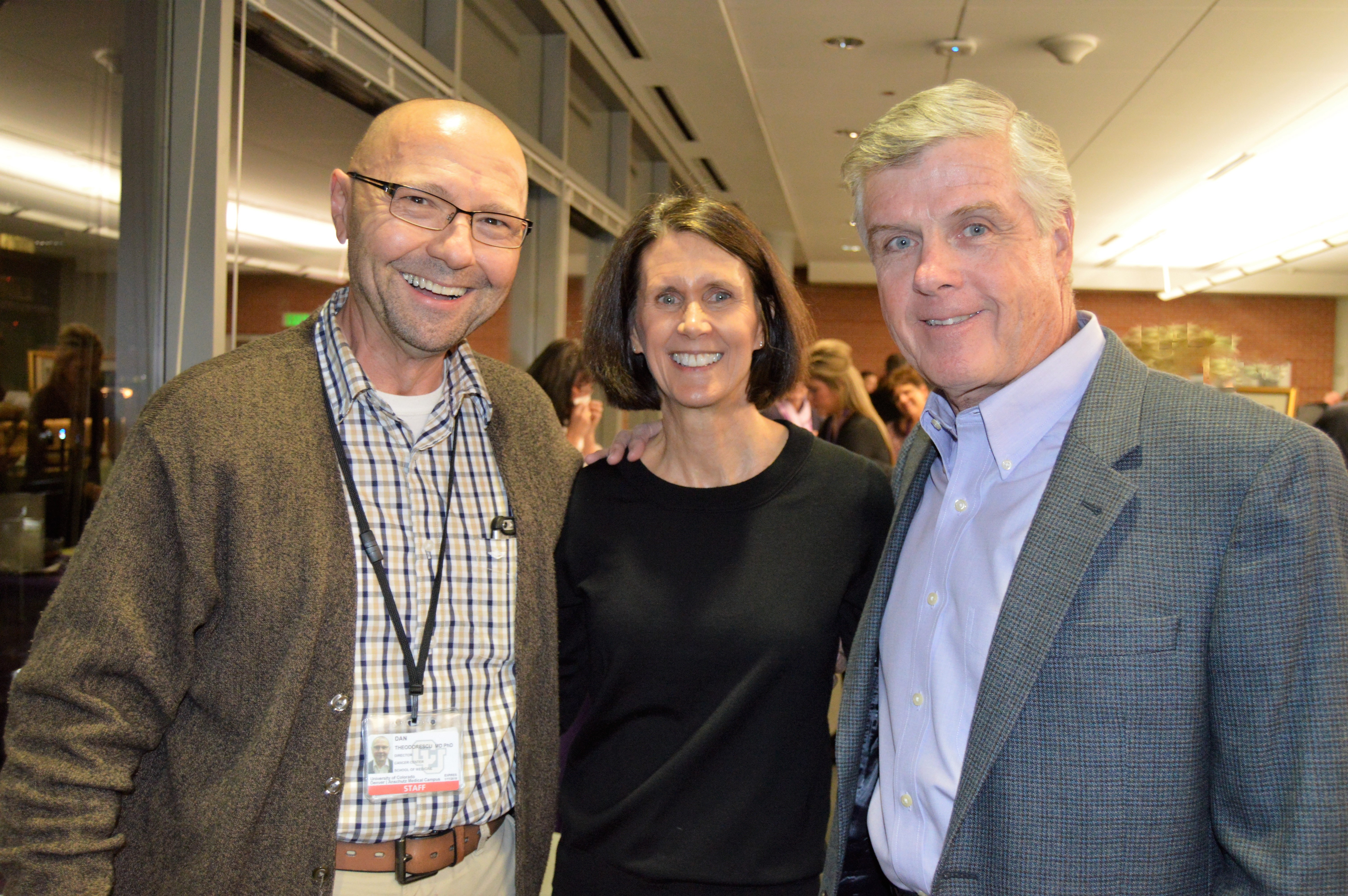(l to r): Dan Theodorescu, with Janet and board member Jim Comerford, a ...