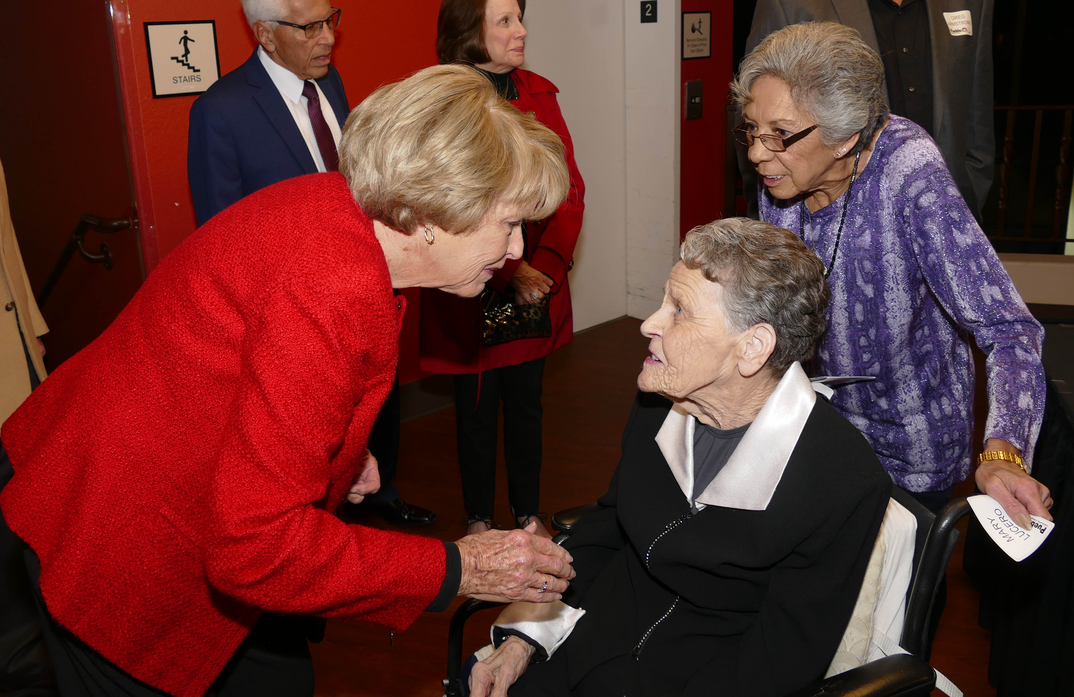 Virginia Shaw, left, greets honoree Rogene Armstrong