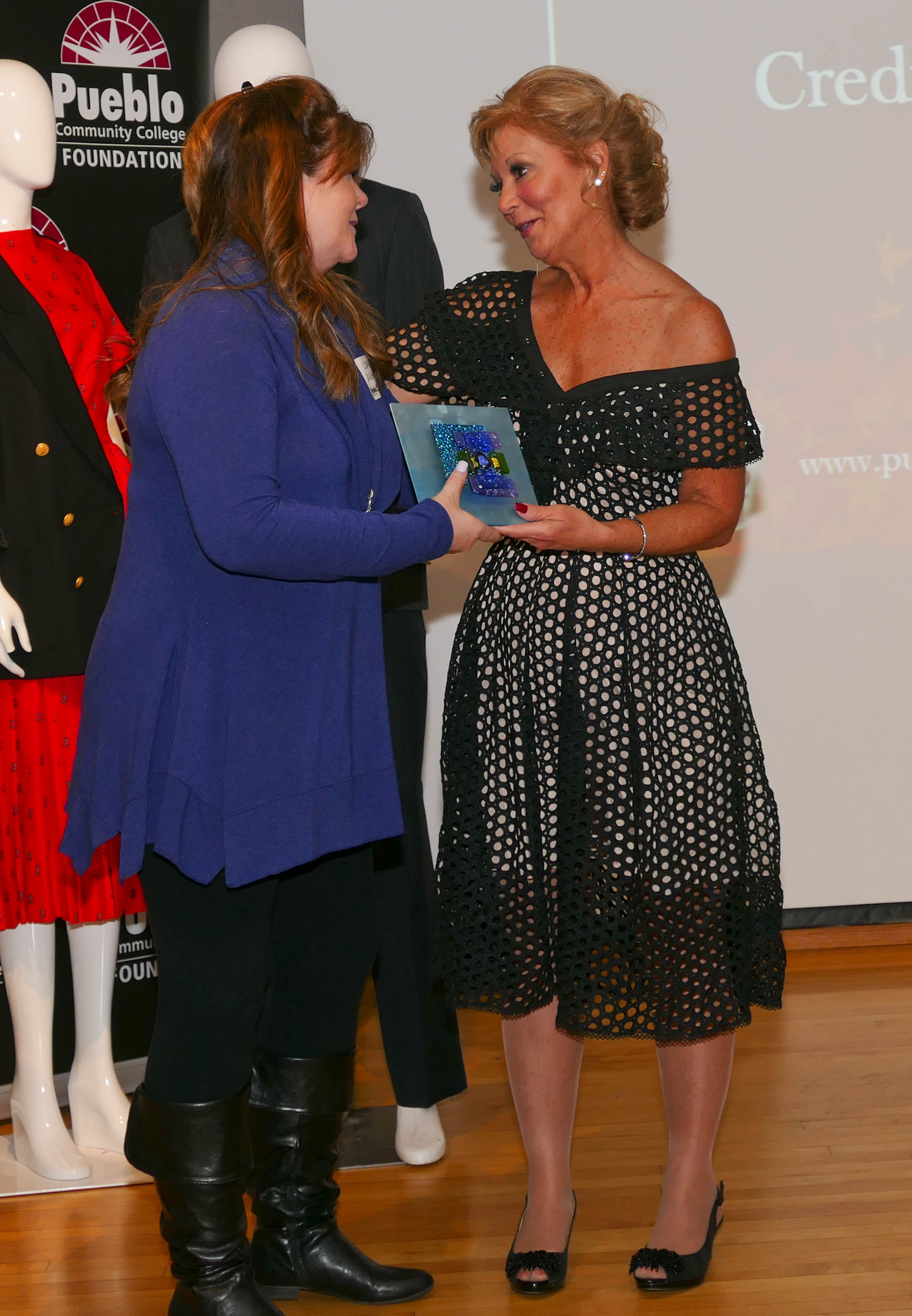 Cara Dasher, director of nursing at CMHIP, accepts the community ...