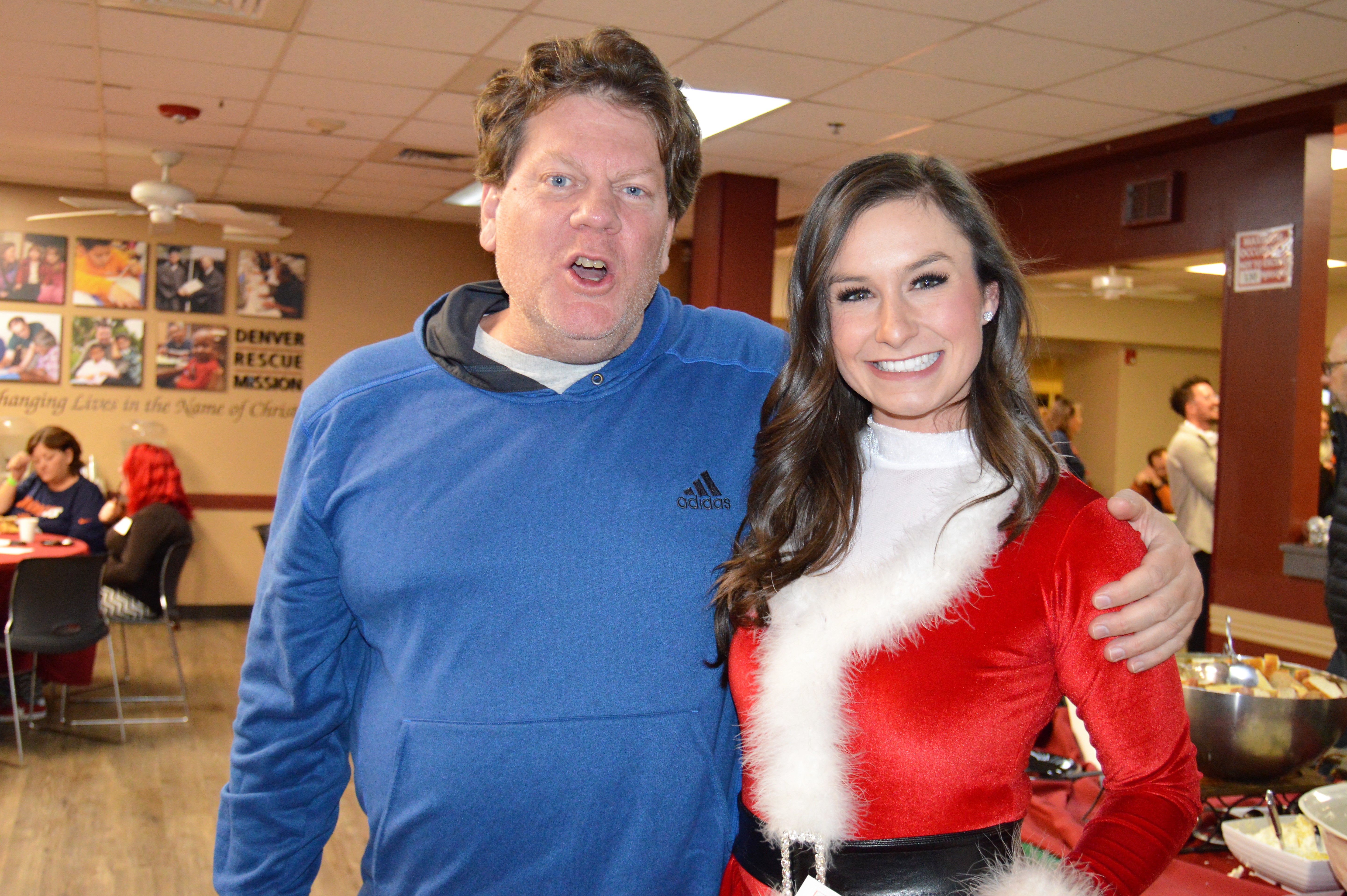 Steve, with Denver Broncos cheerleader Sara
