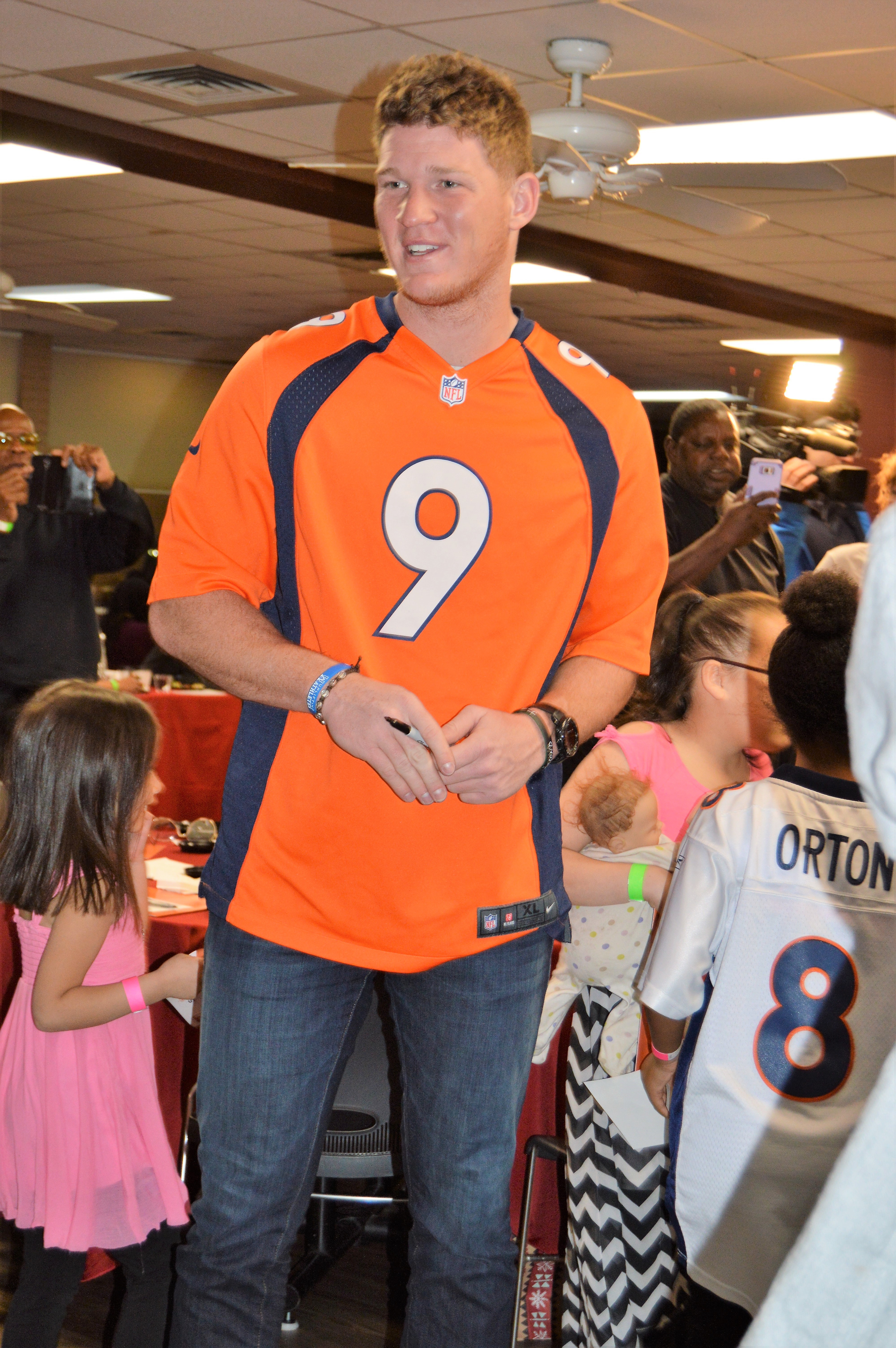 Riley Dixon (9) towers over kids--and most of the adults--at the reception.