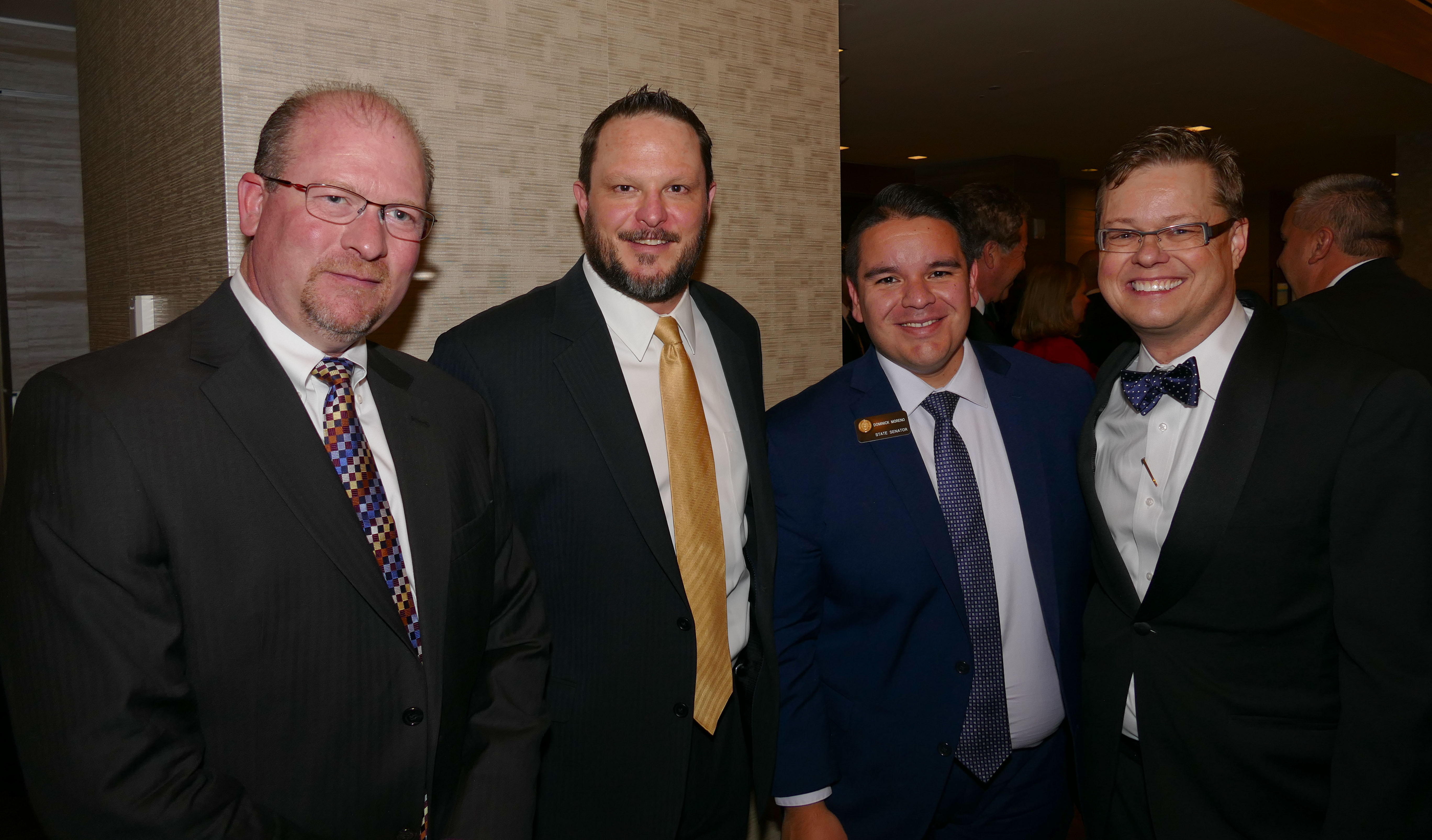 Gary Pulford, left, Jason McEldowney, Senator Dominick Moreno, Tilman Adair