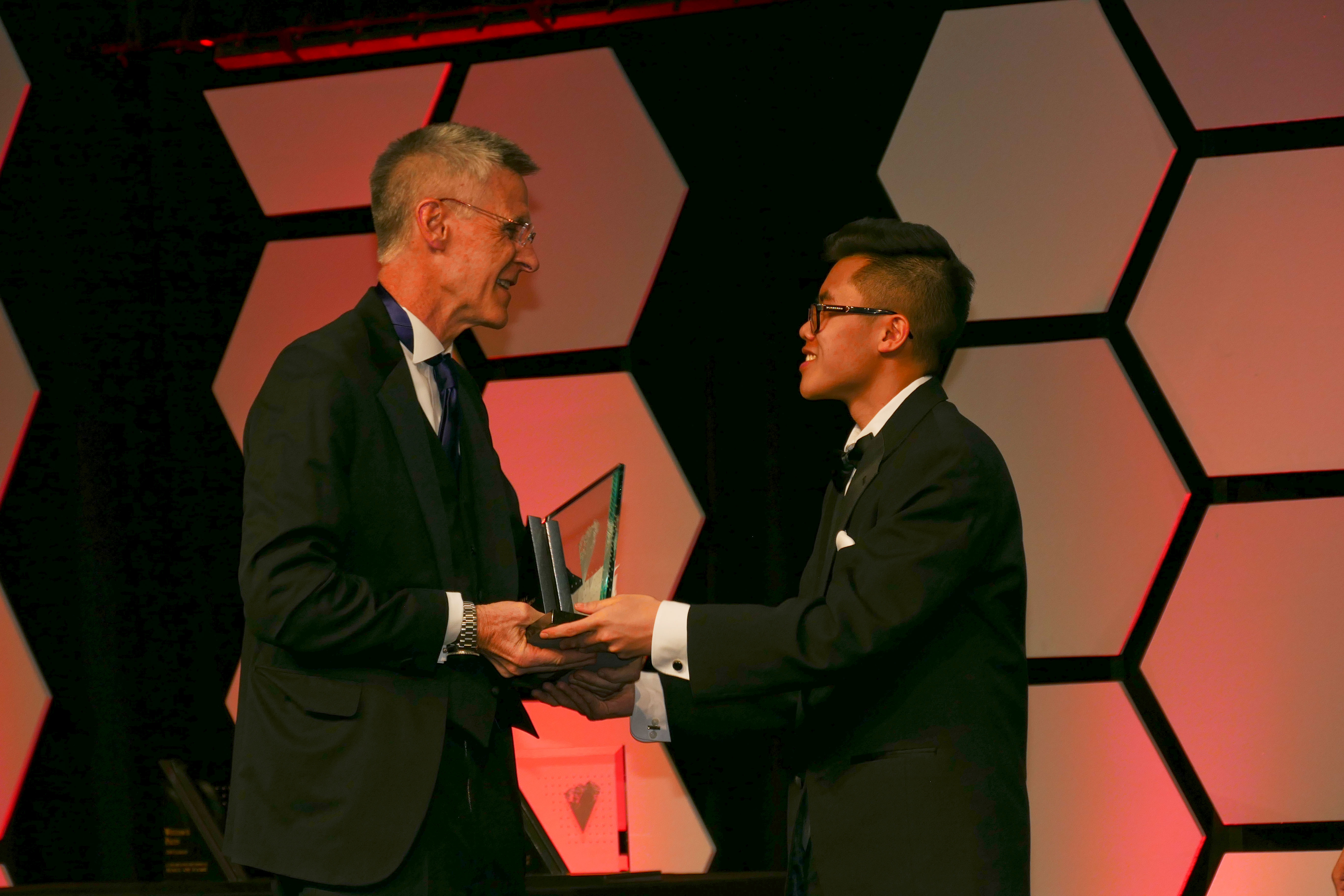 Jim Johnson accepts his award