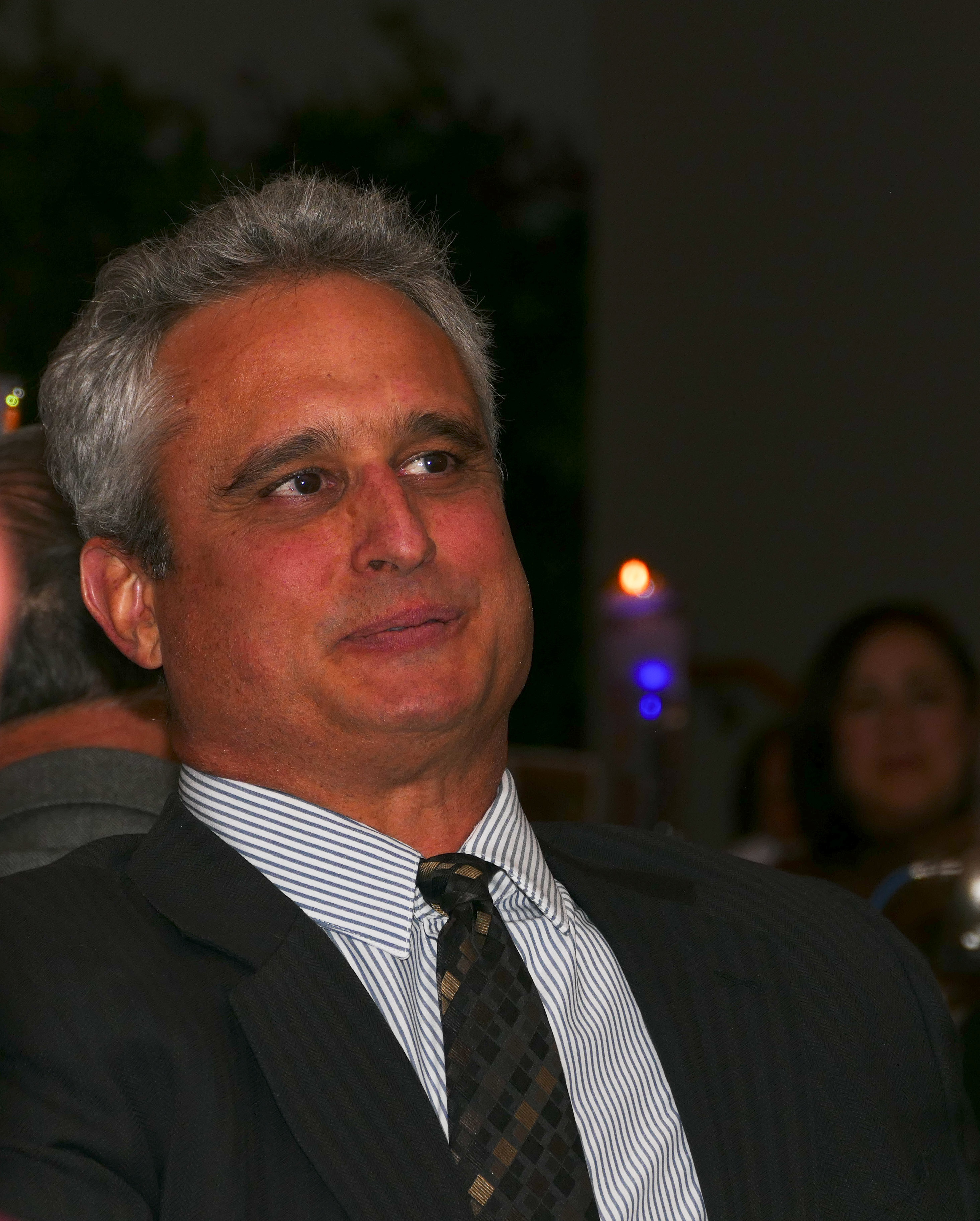 Honoree Dan DeRose listens to his introduction