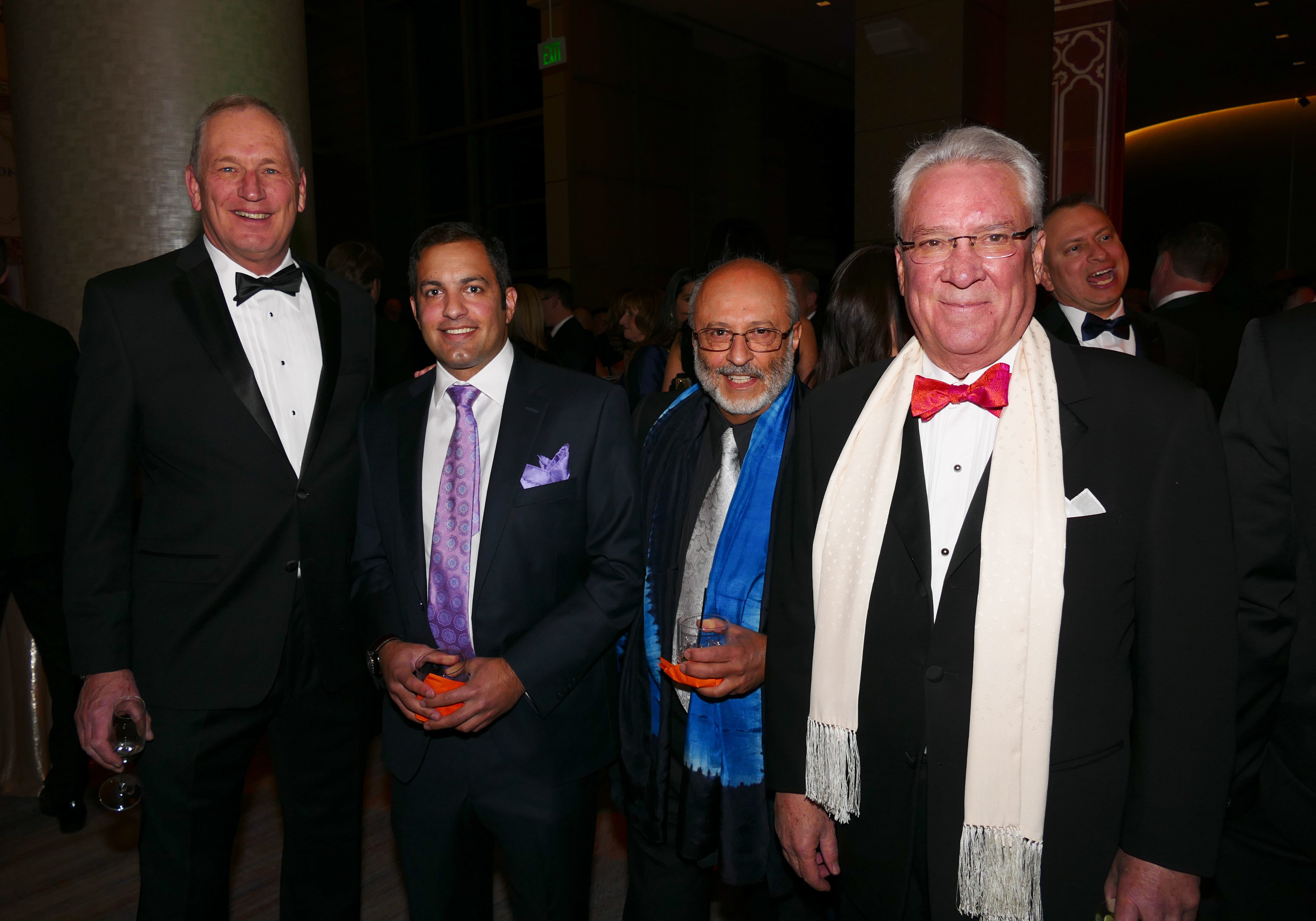 Rob Renner, left, Jon Merage, David Merage and Board Chair Blair Richardson