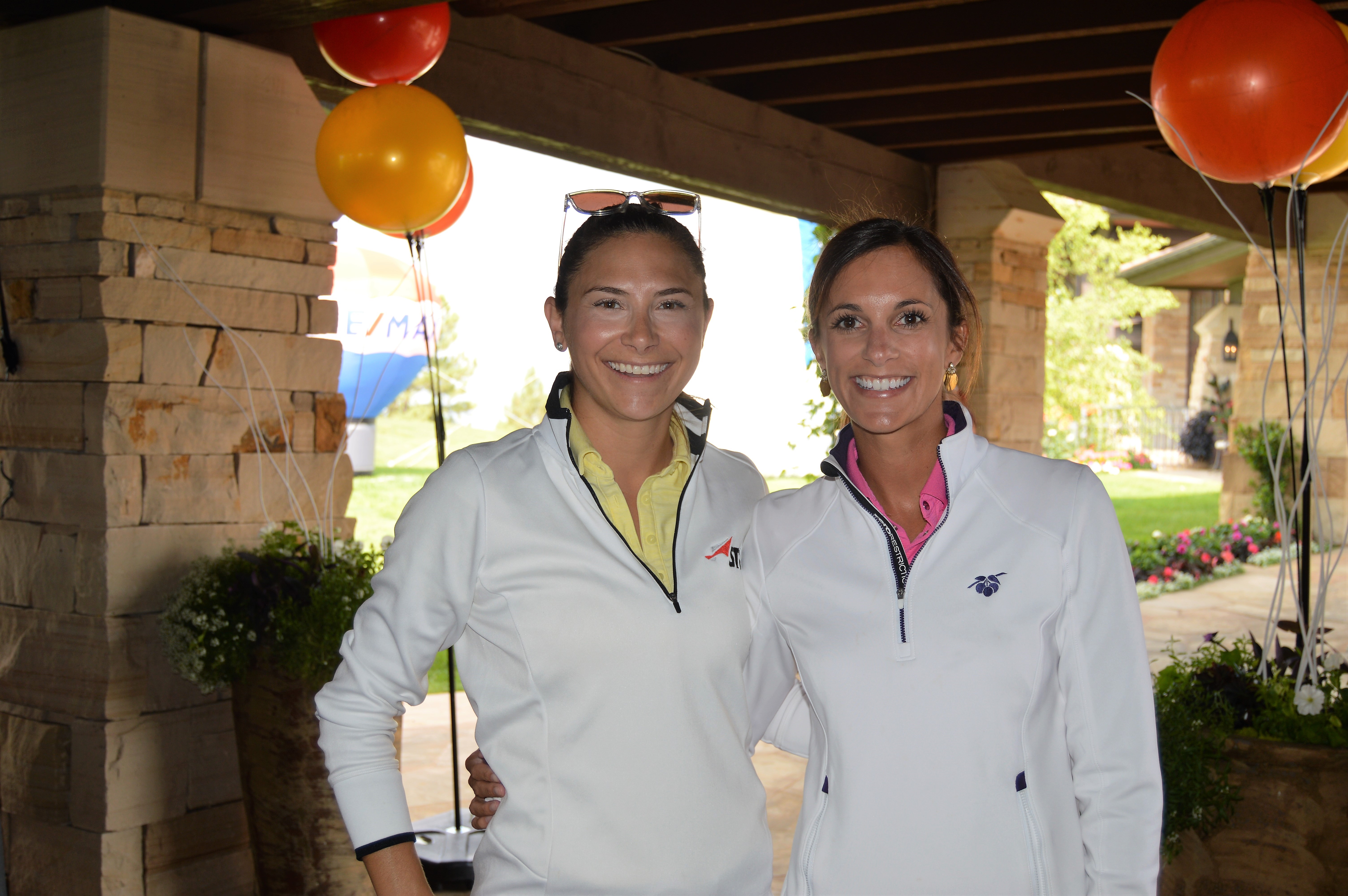 Sponsor Sachi Osatinski (left) and Emily Olson