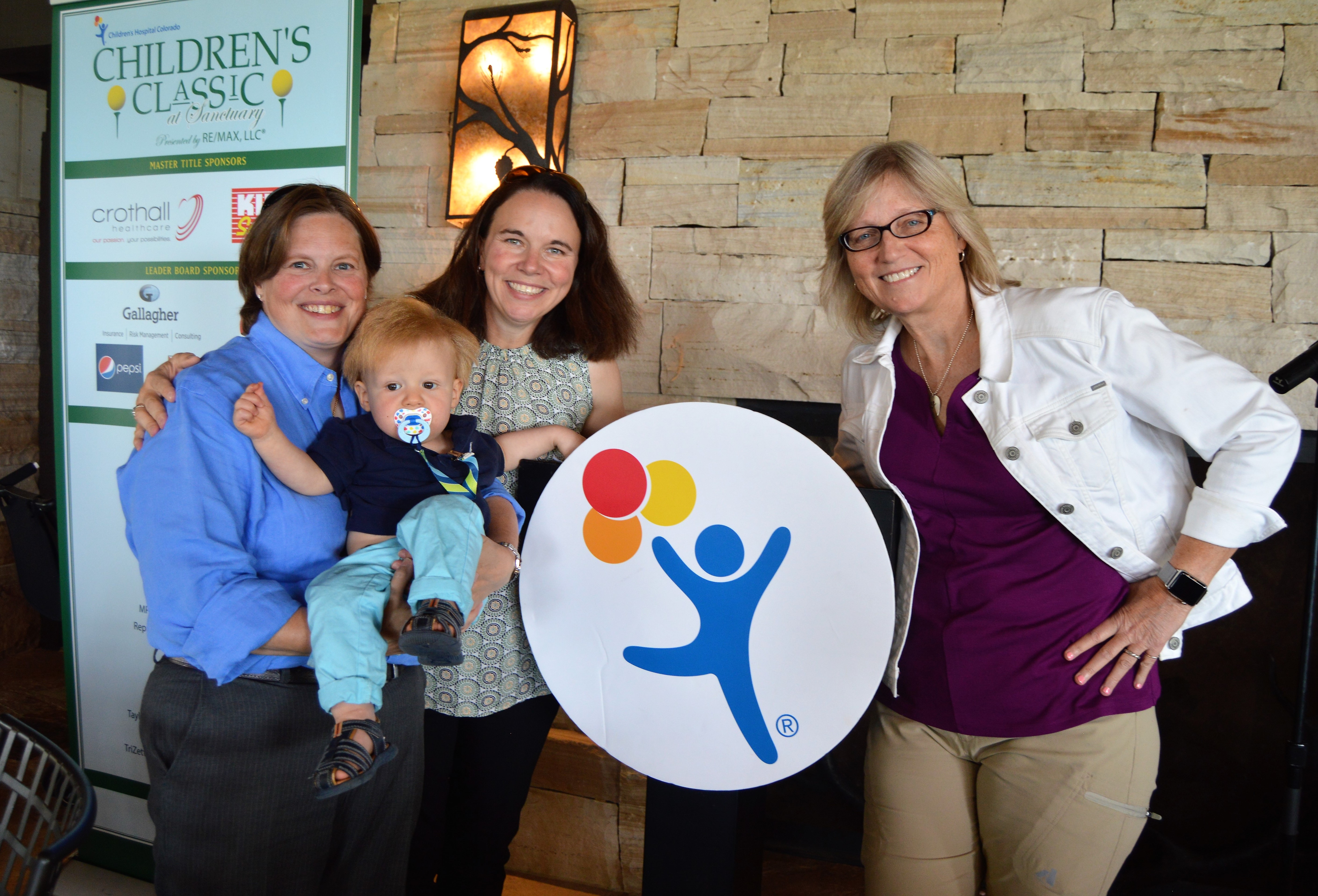 (l to r) Debbie, Eli and Jennifer Stevenson, with director of Children ...
