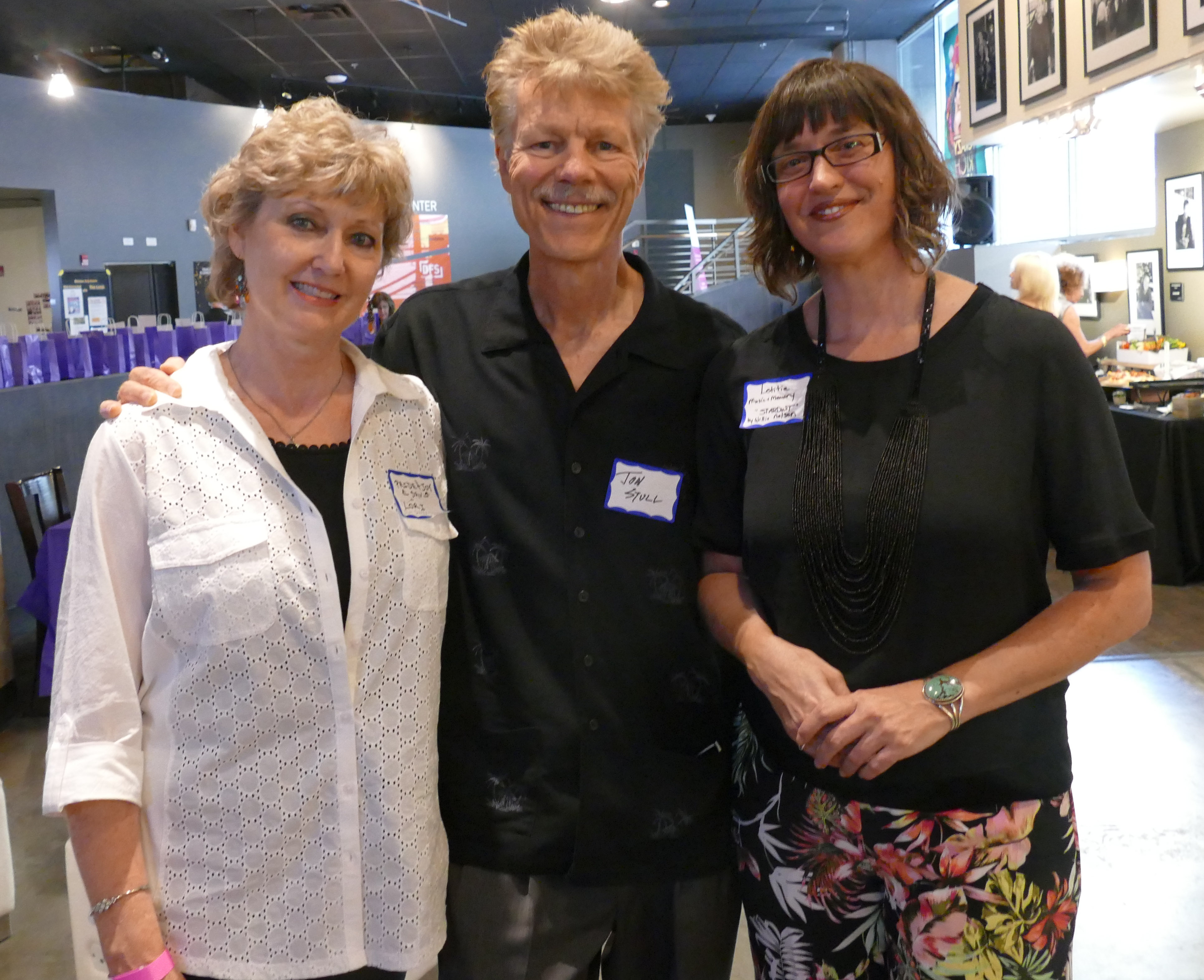 Lori McCain, left, Jon Stull and Letitia Rogers, M & M regional director