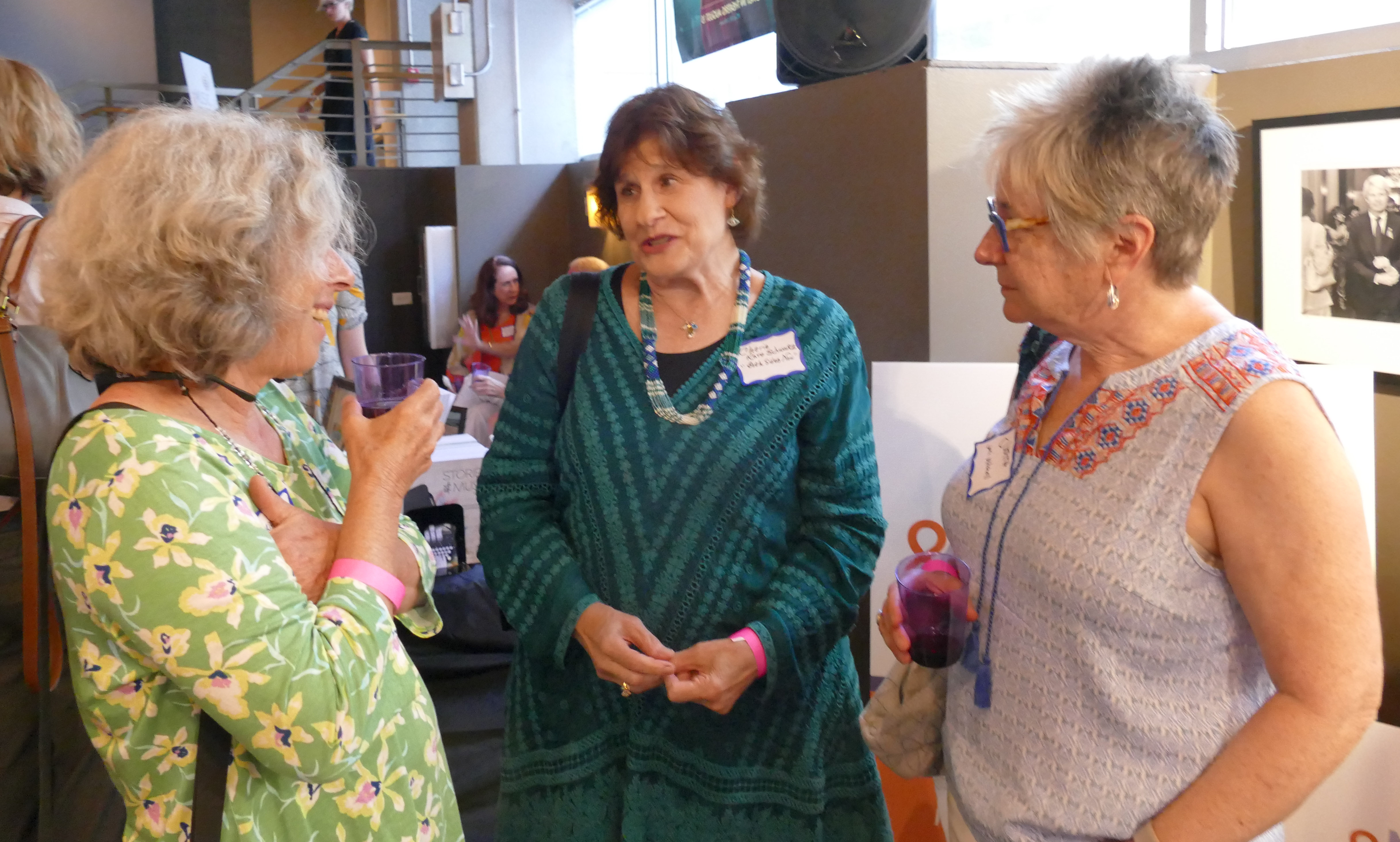 Friends chatted about what they put on their nametag as "favorite song"