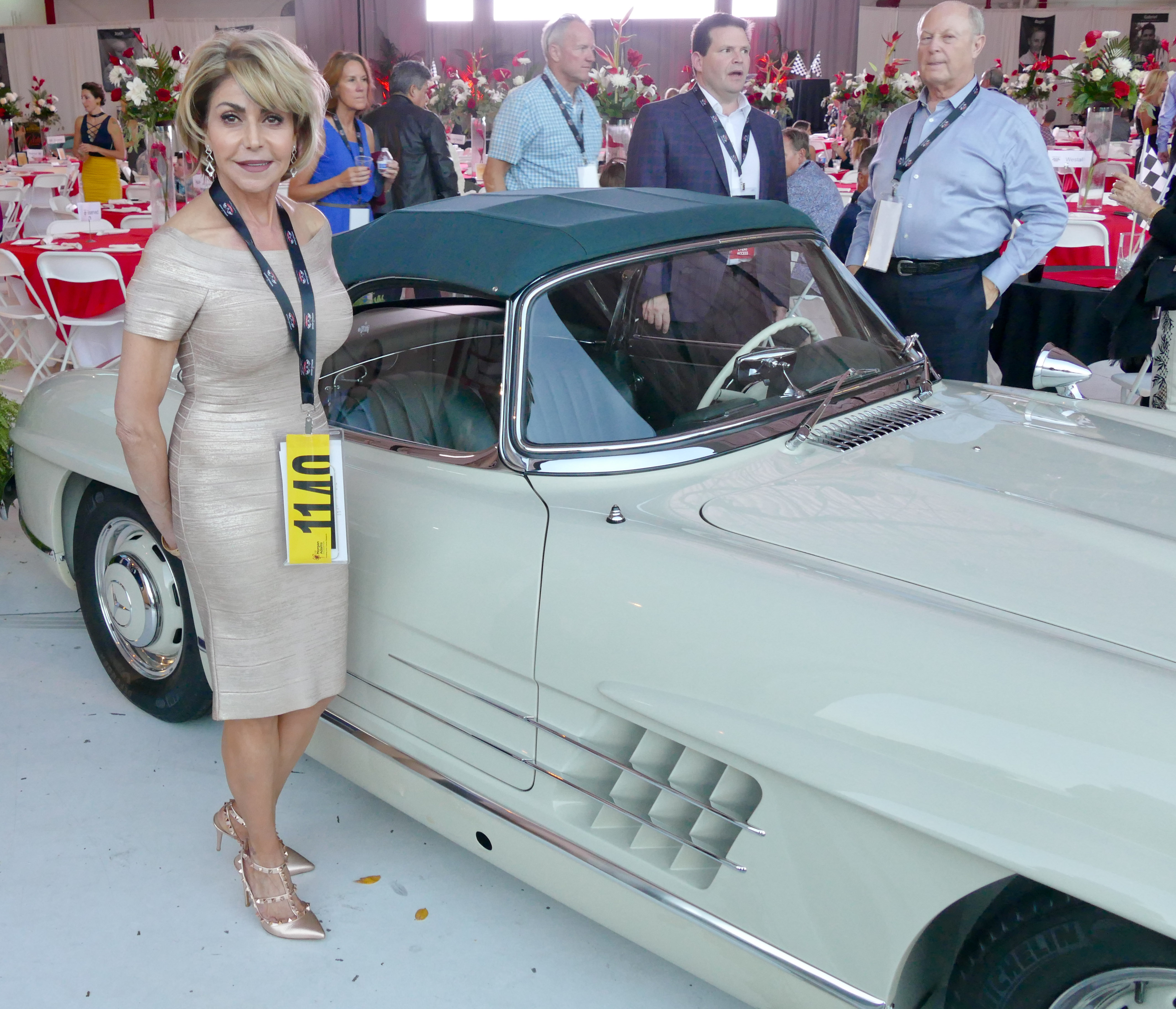 Carole Zeigler in front of her 1957 Mercedes Benz Gullwing