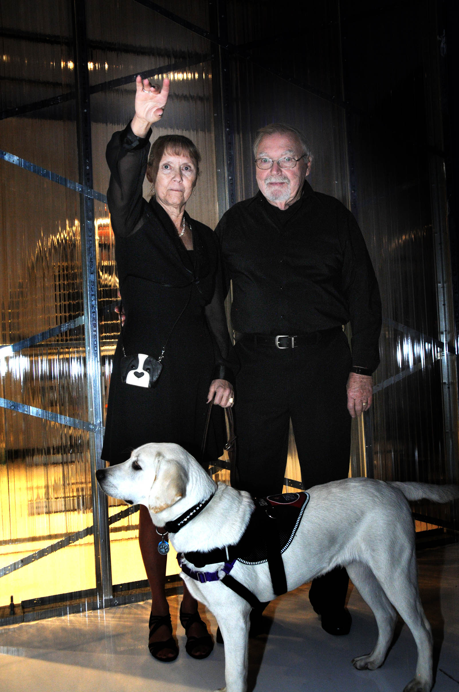 Cathy and Don Kennedy try to get Tater to smile