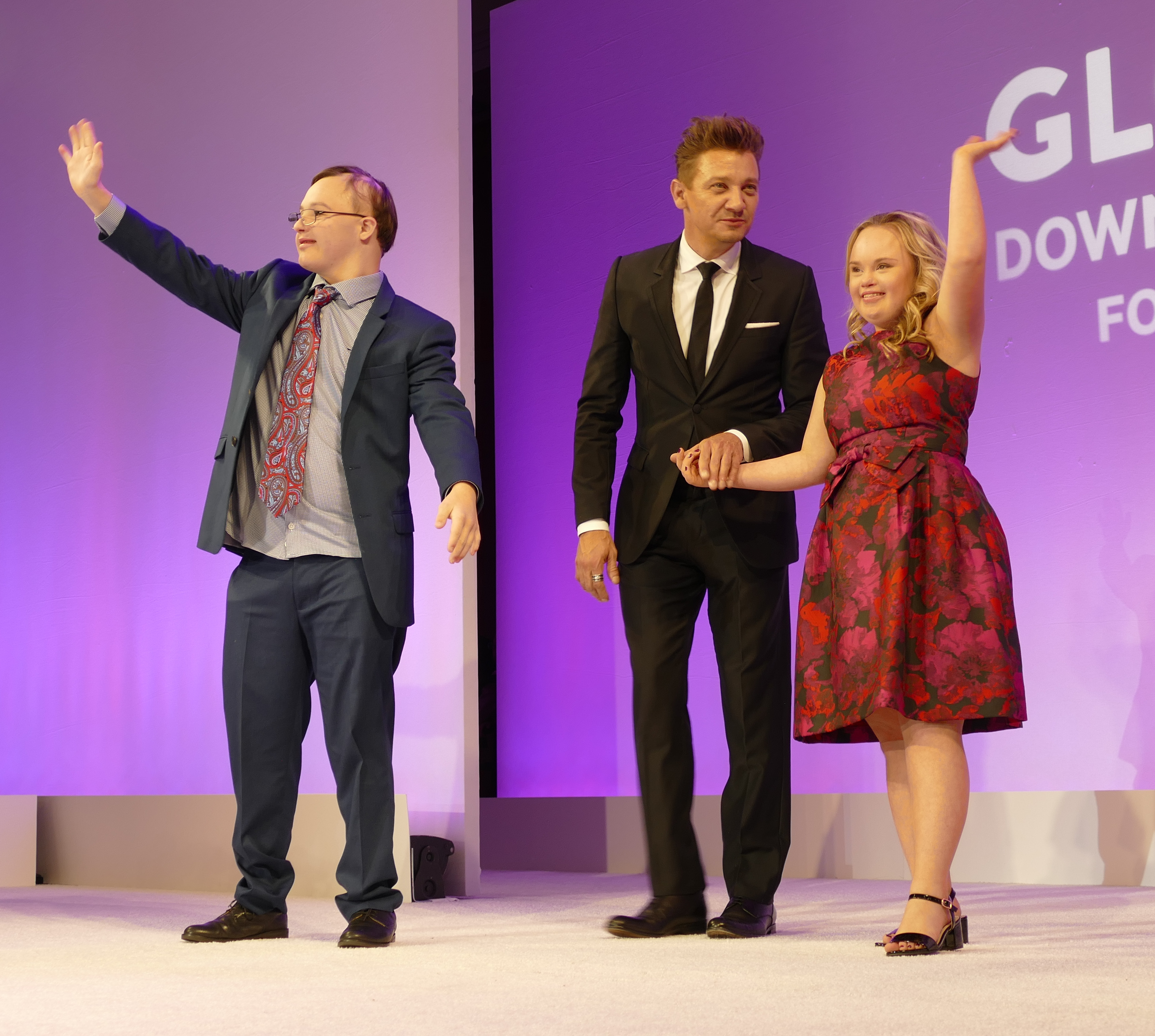 Jeremy Renner with models Walt Snodgrass and Charlotte Fonfara LaRose