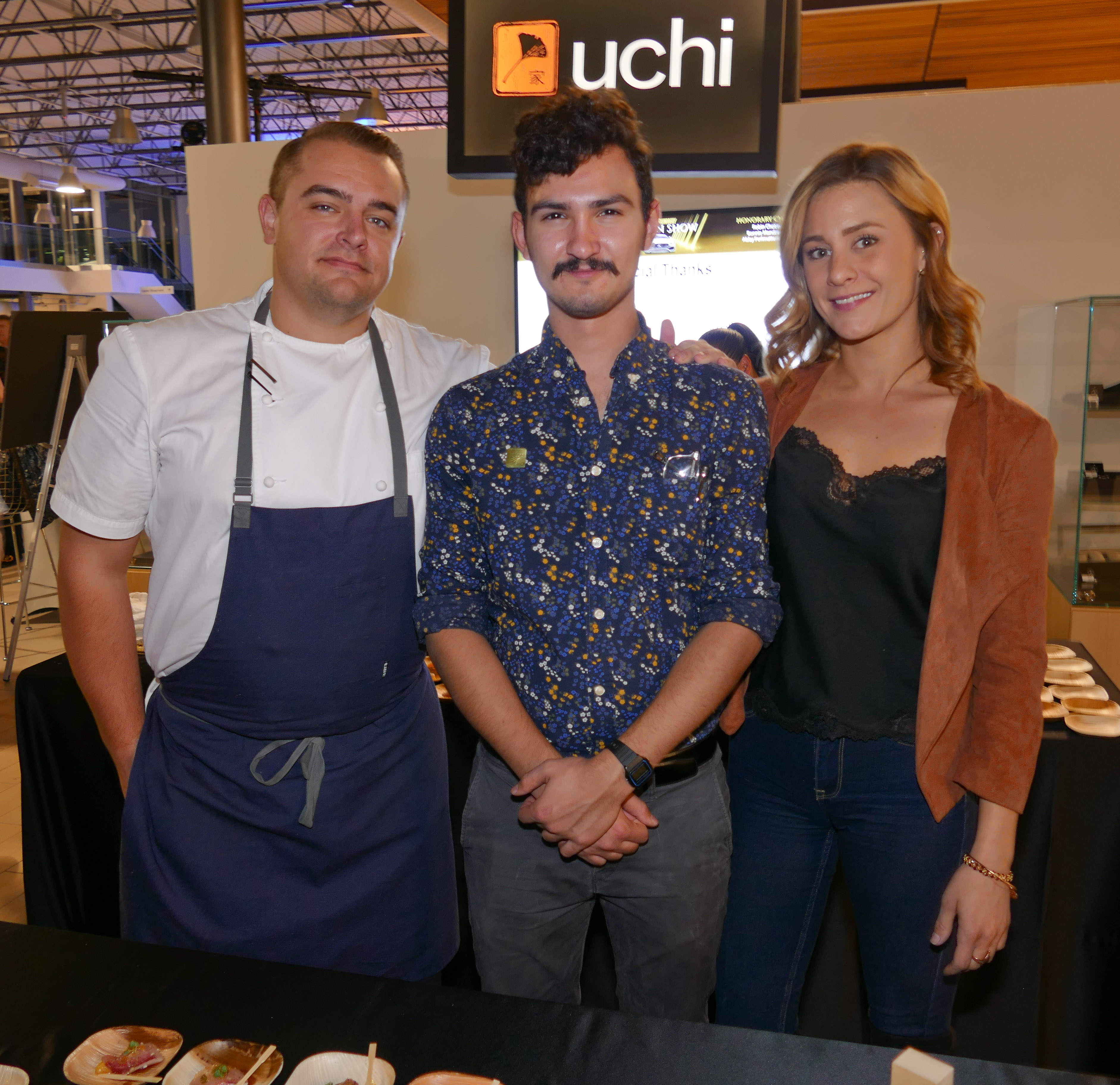 Brandon Brumback, left, Arvind Hathaway and Julie Calabrese serving up ...
