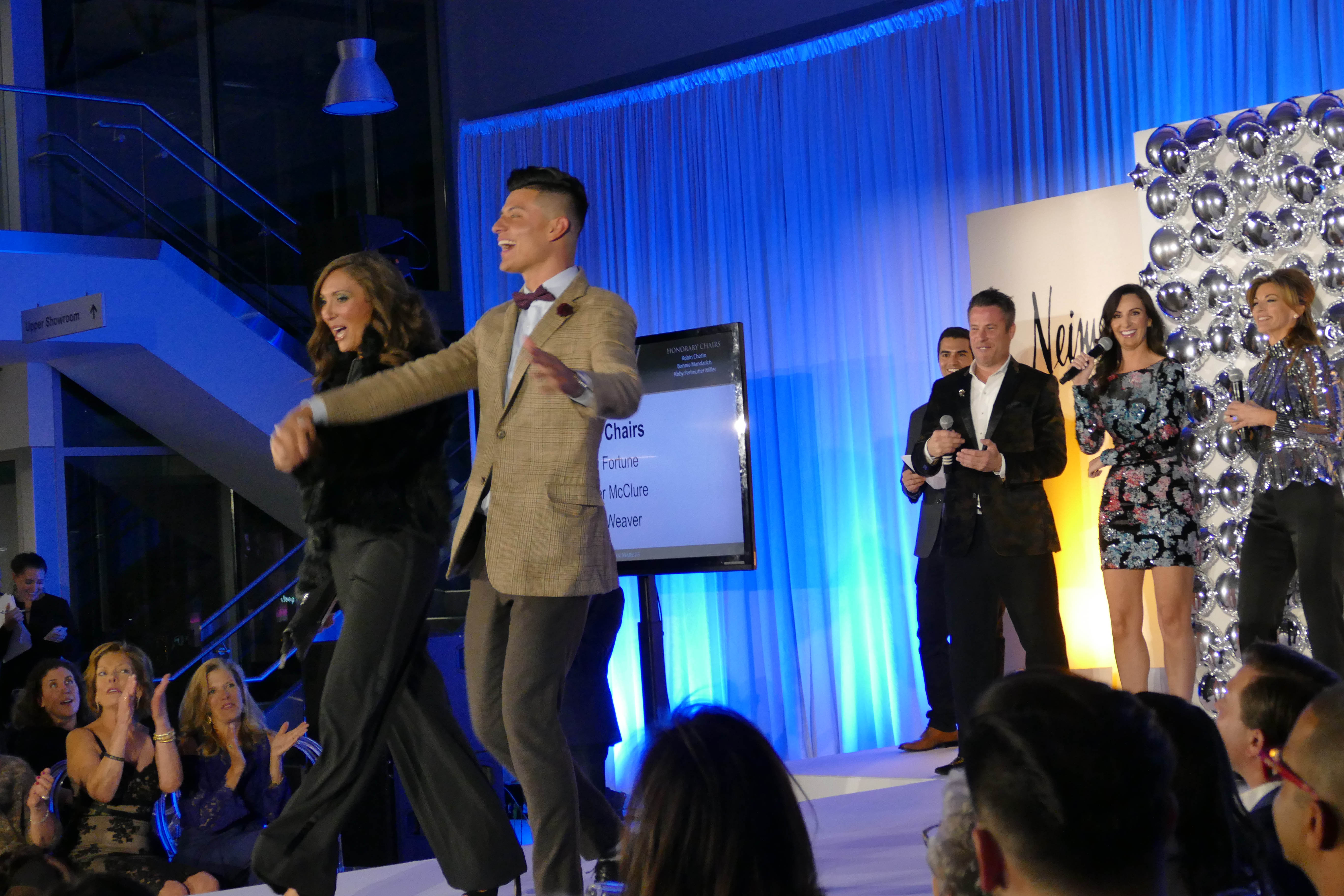 Lisa Walko and Hugo Barraza take a walk down the stage