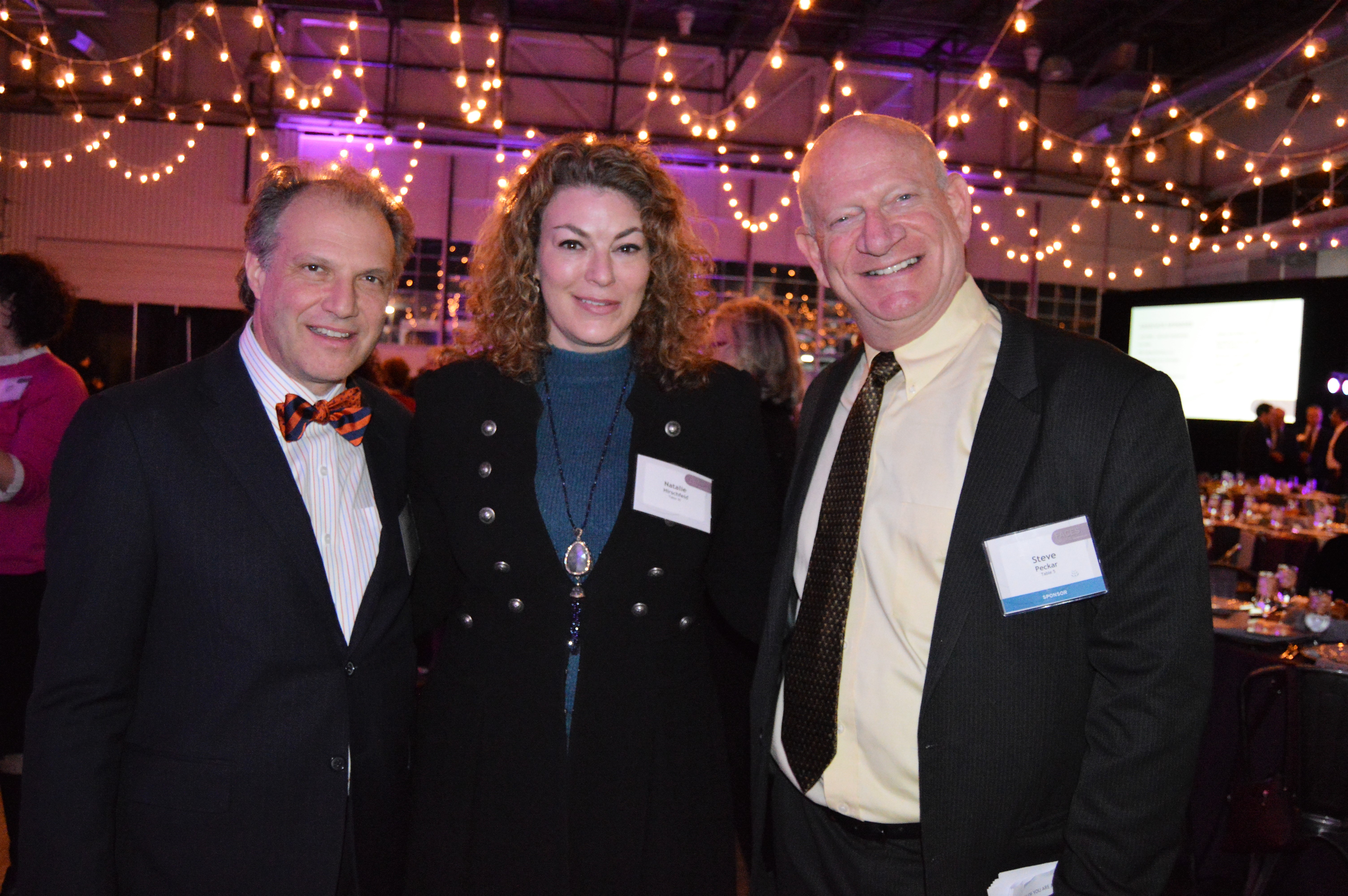 Jeffrey and Natalie Hirschfeld, with Steve Peckar (right)