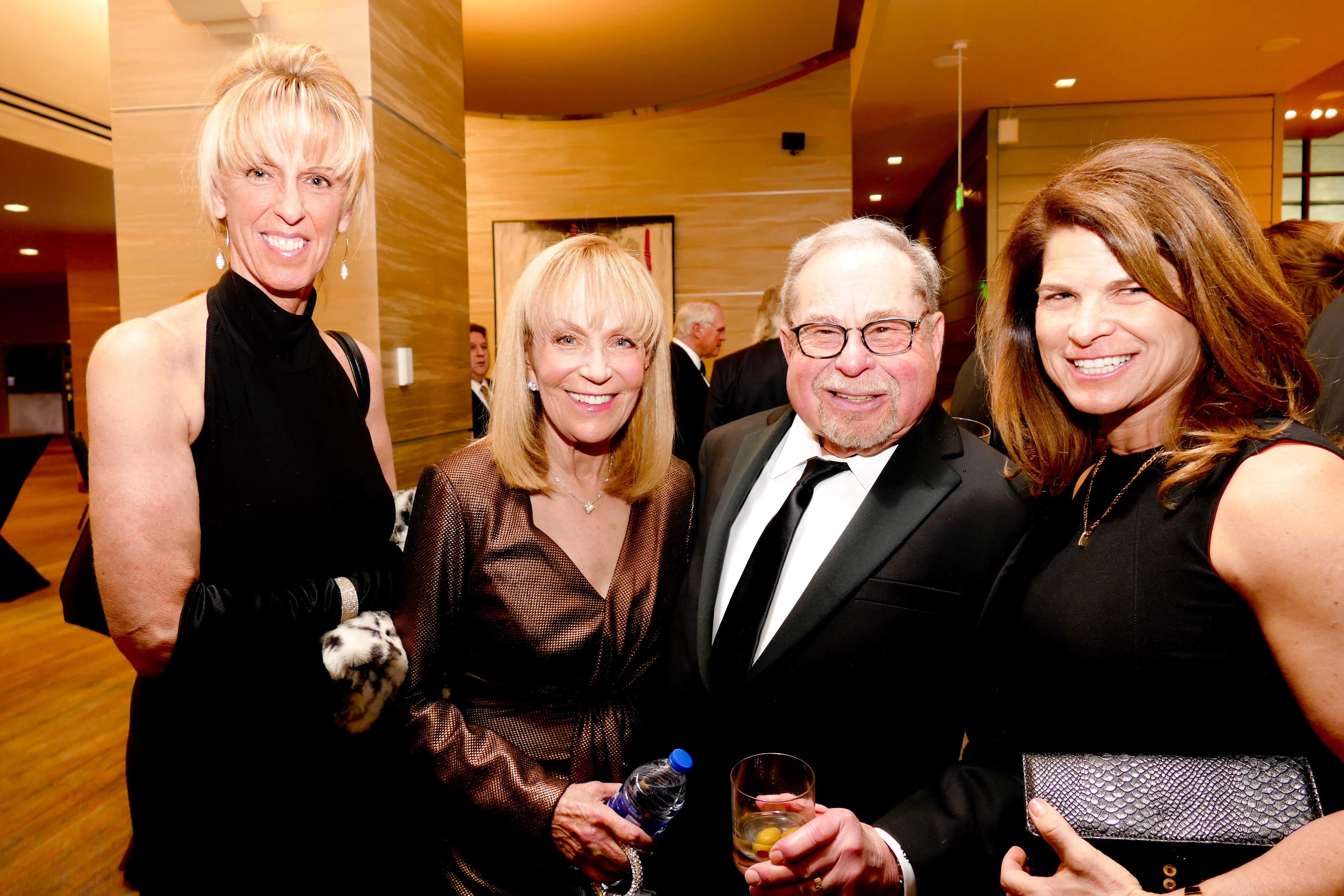 Bobbie Jo Kinsey, left, Evi and Evan Makovsky (2019 inductee), and ...