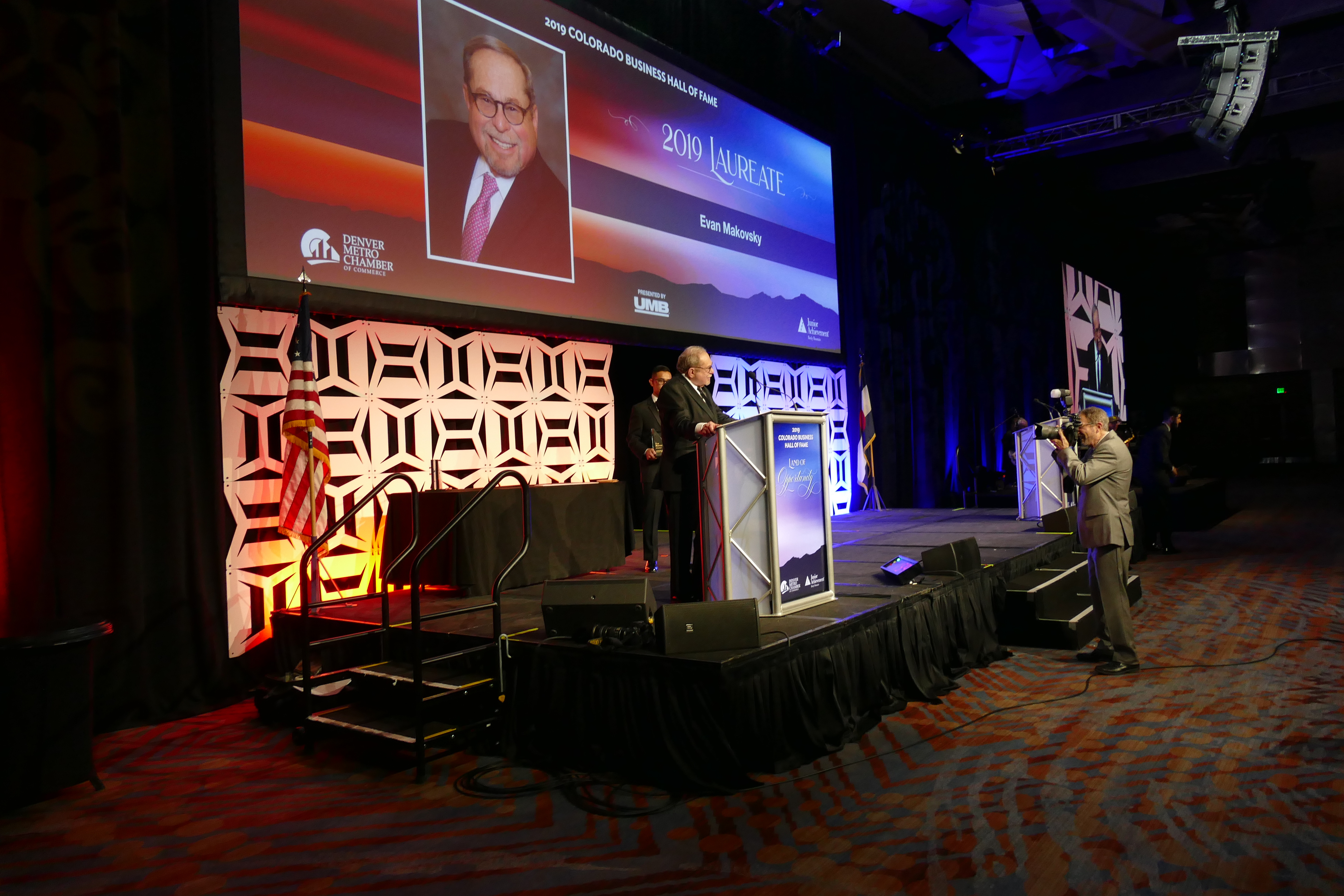 Evan Makovsy takes the stage to accept his honor as 2019 Laureate