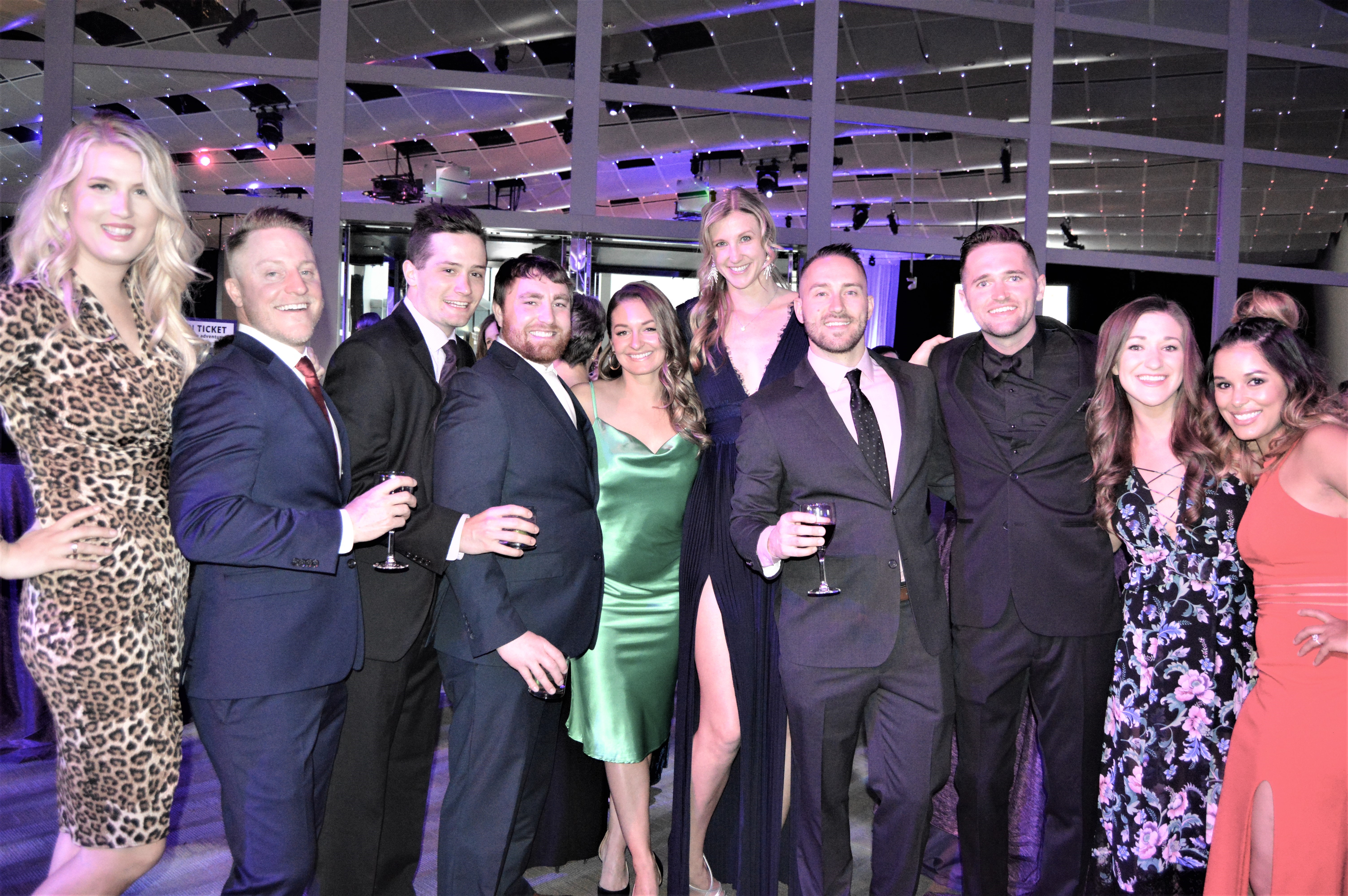 A happy group of gala guests in the Seawell Ballroom