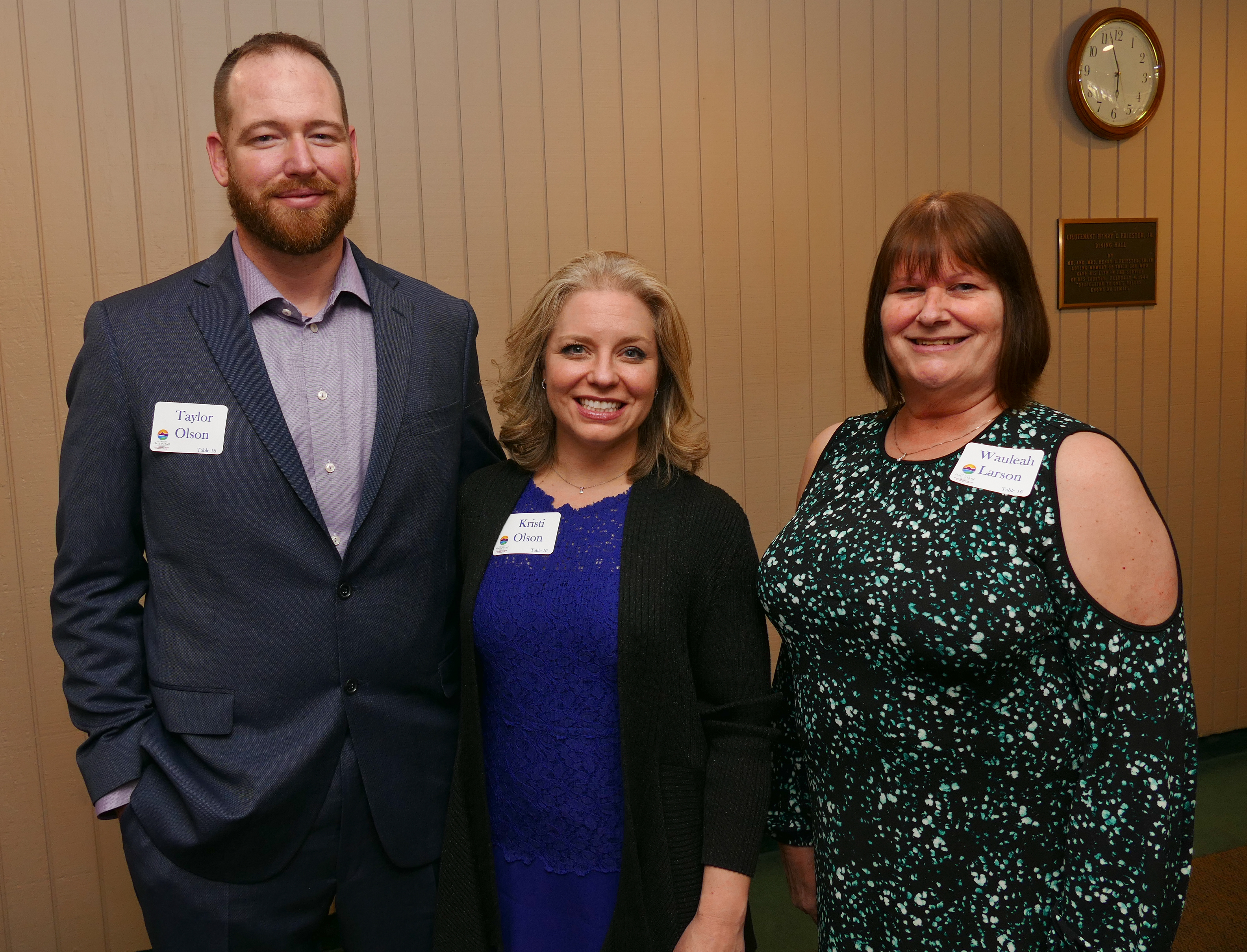 Taylor and Kristi Olson, left, with Wauleah Larson