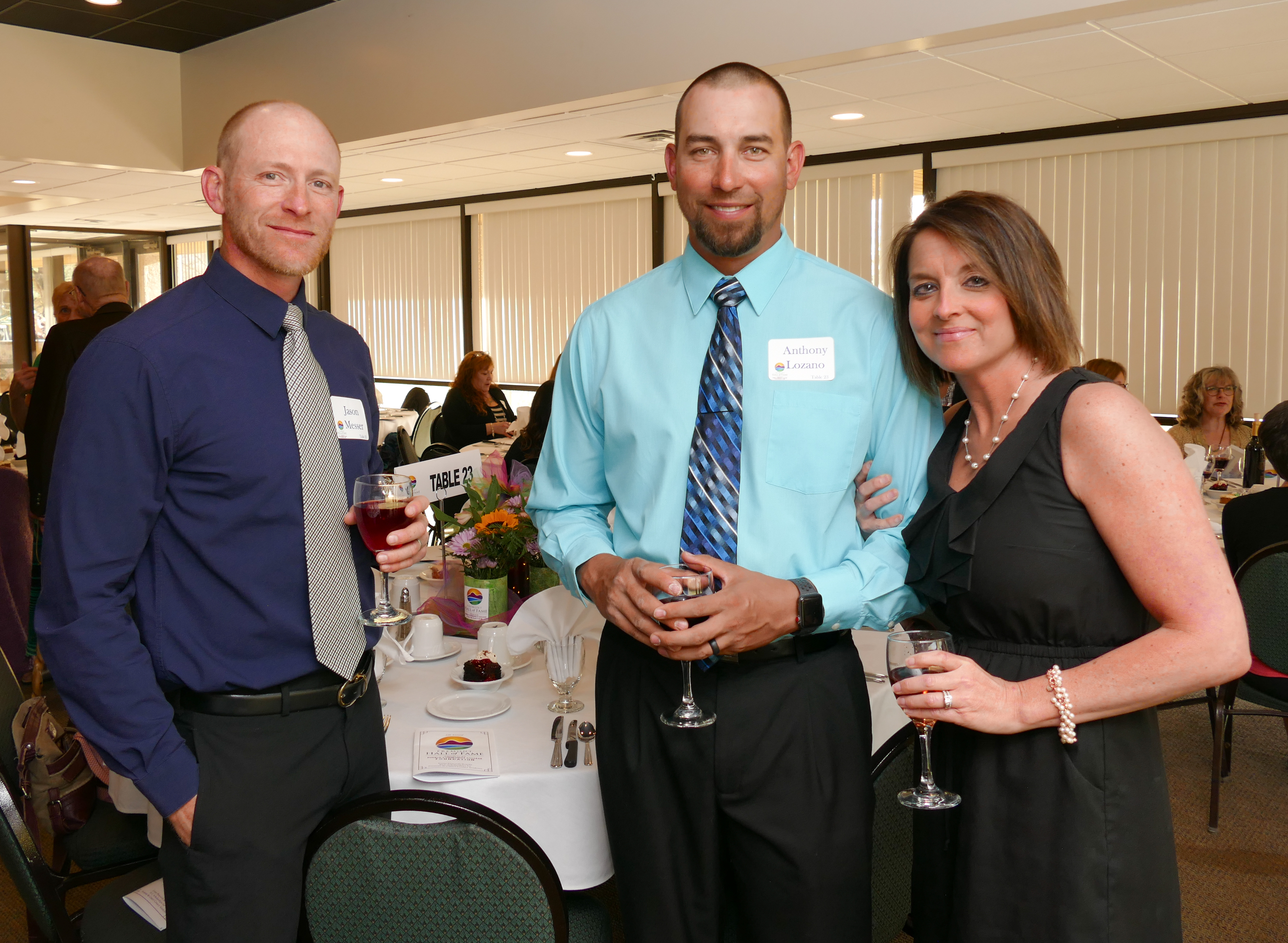 Jason Messer (committee), left, with Anthony and Dena Lozano