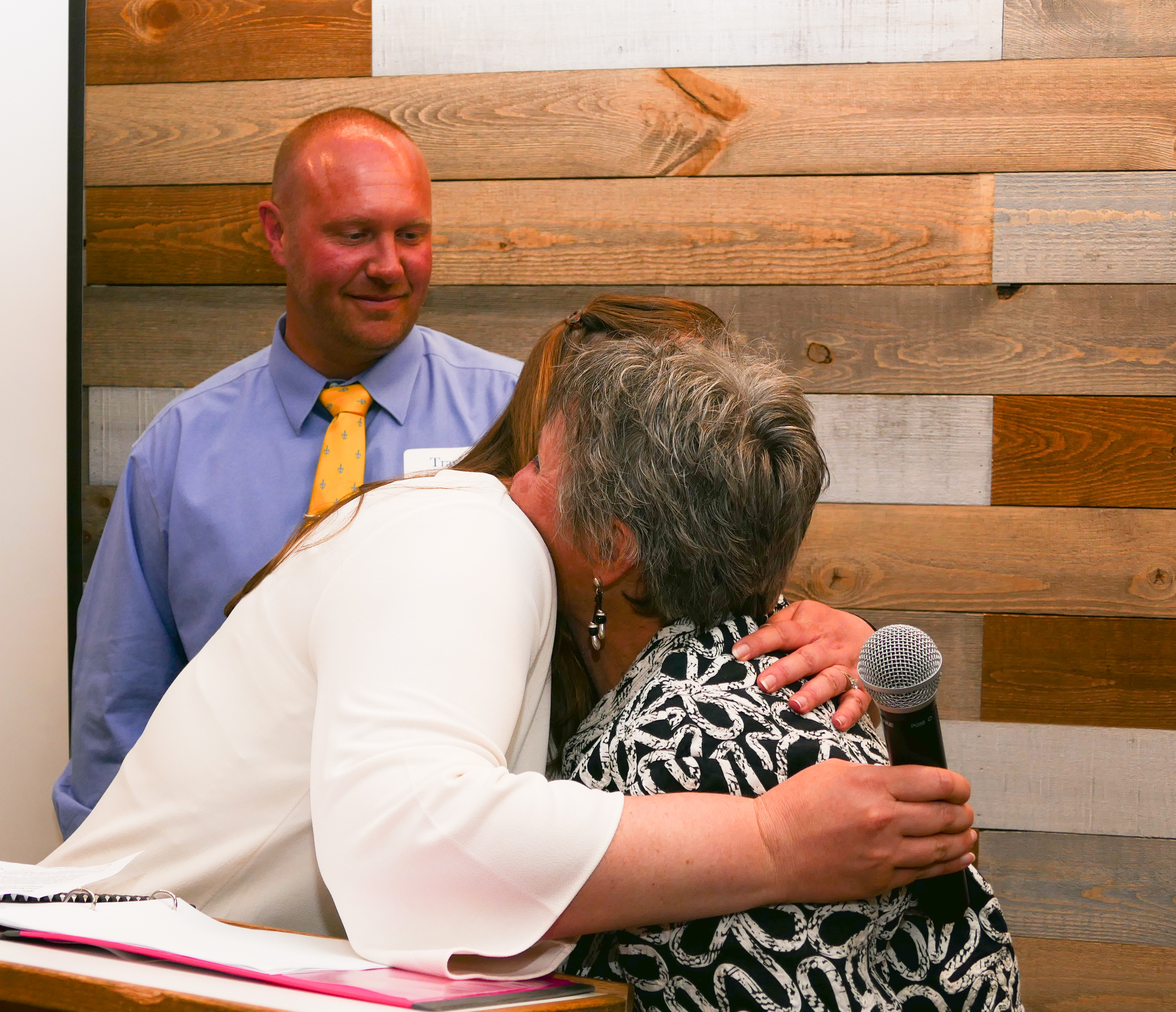 Char Lindner gets a hug from her kids, Travis and Brooke