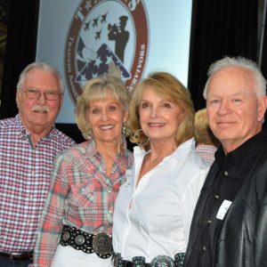 Dean and Adrienne Singleton (front, right), with tablemates