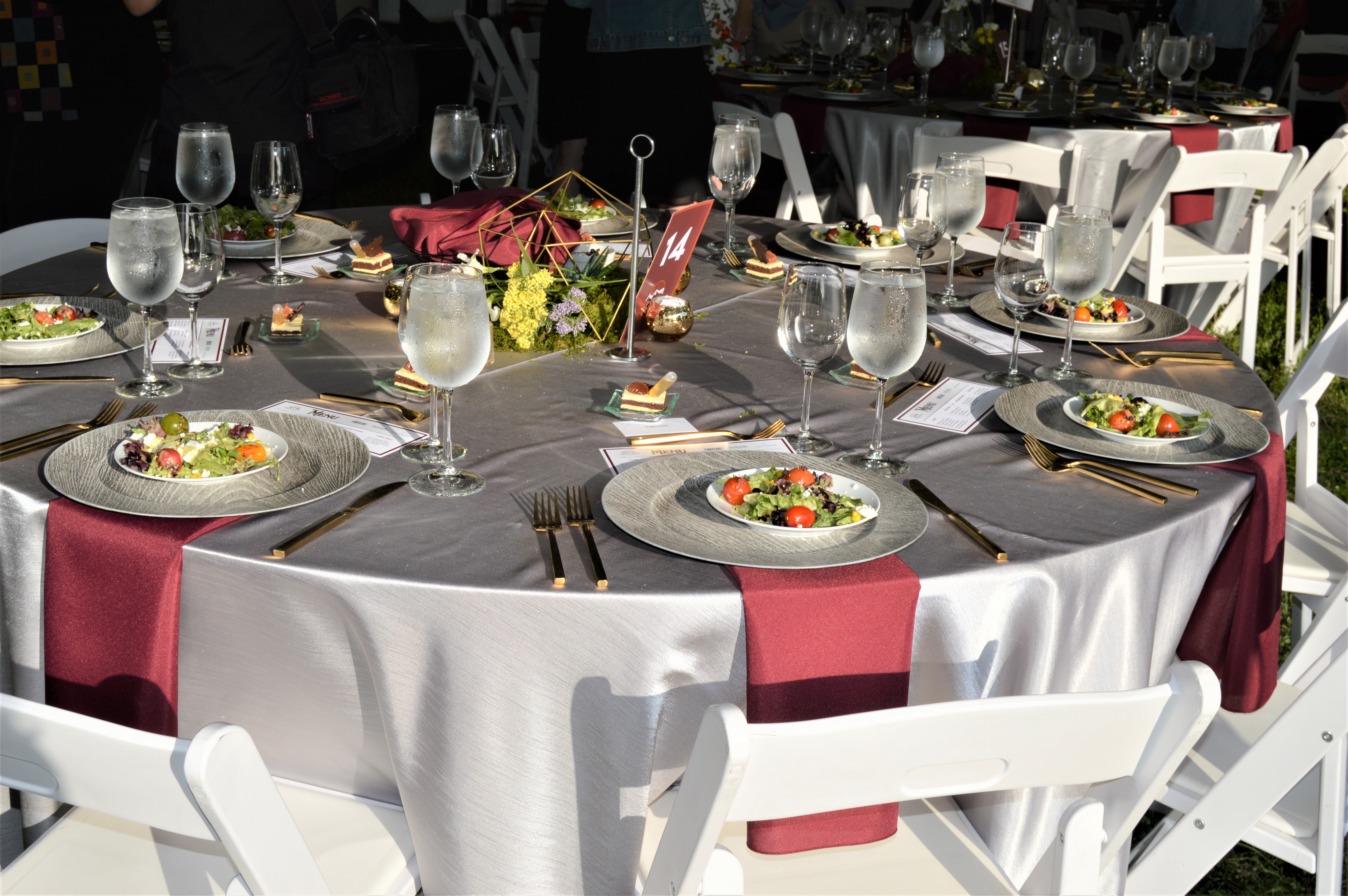 Tables are readied for 250 guests.