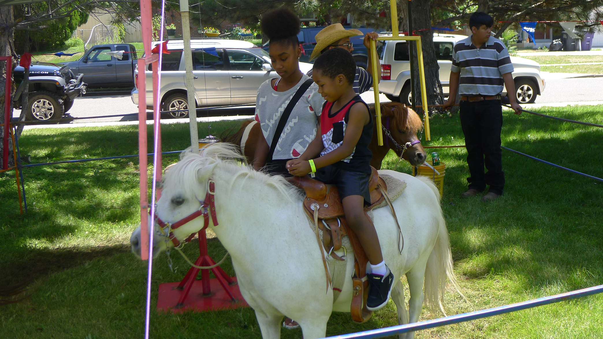 A pony ride in summer is quite a treat