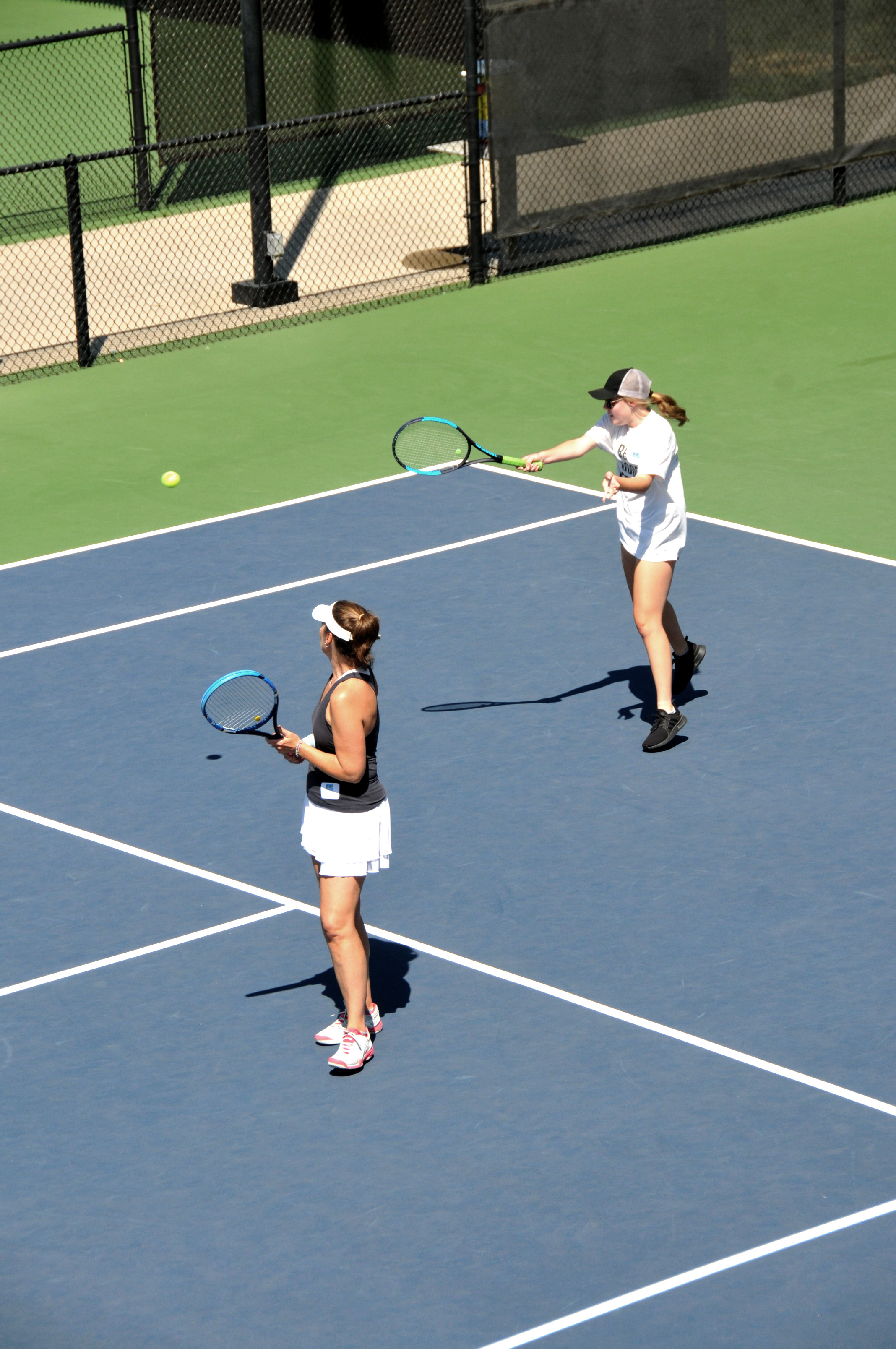 Brie Stewart fires a forehand down the line