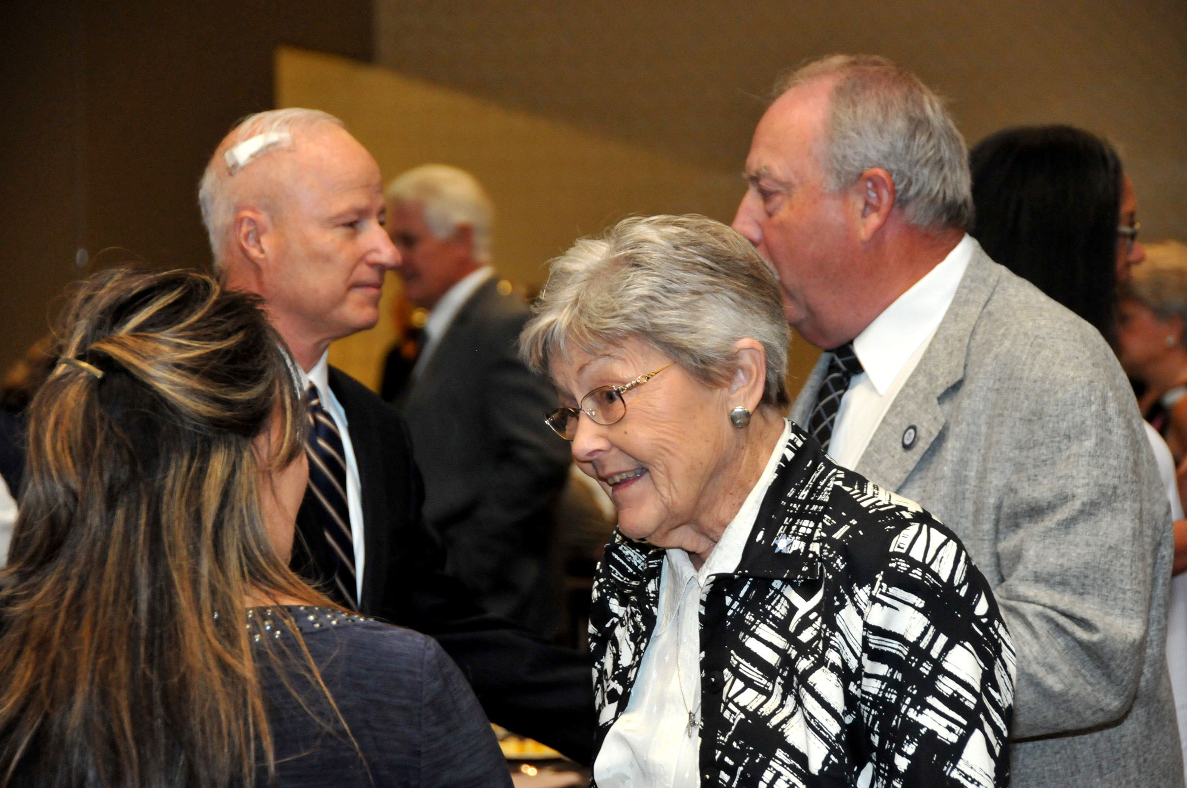 Sandy Sweeney, with Mike Coffman in back