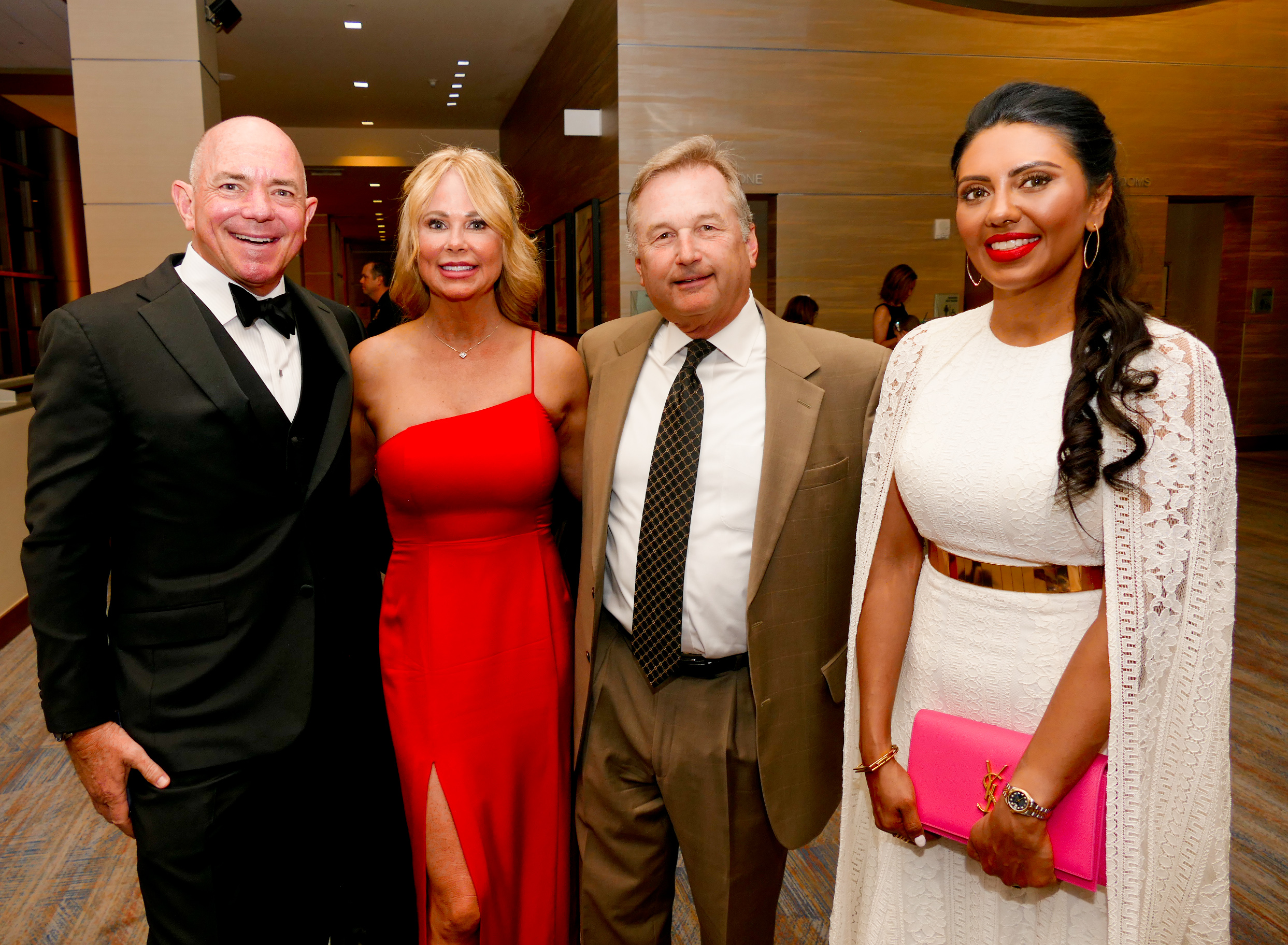 Darryl and Kimberly Traweek, left, Mike Painter, Reva Shakkotai