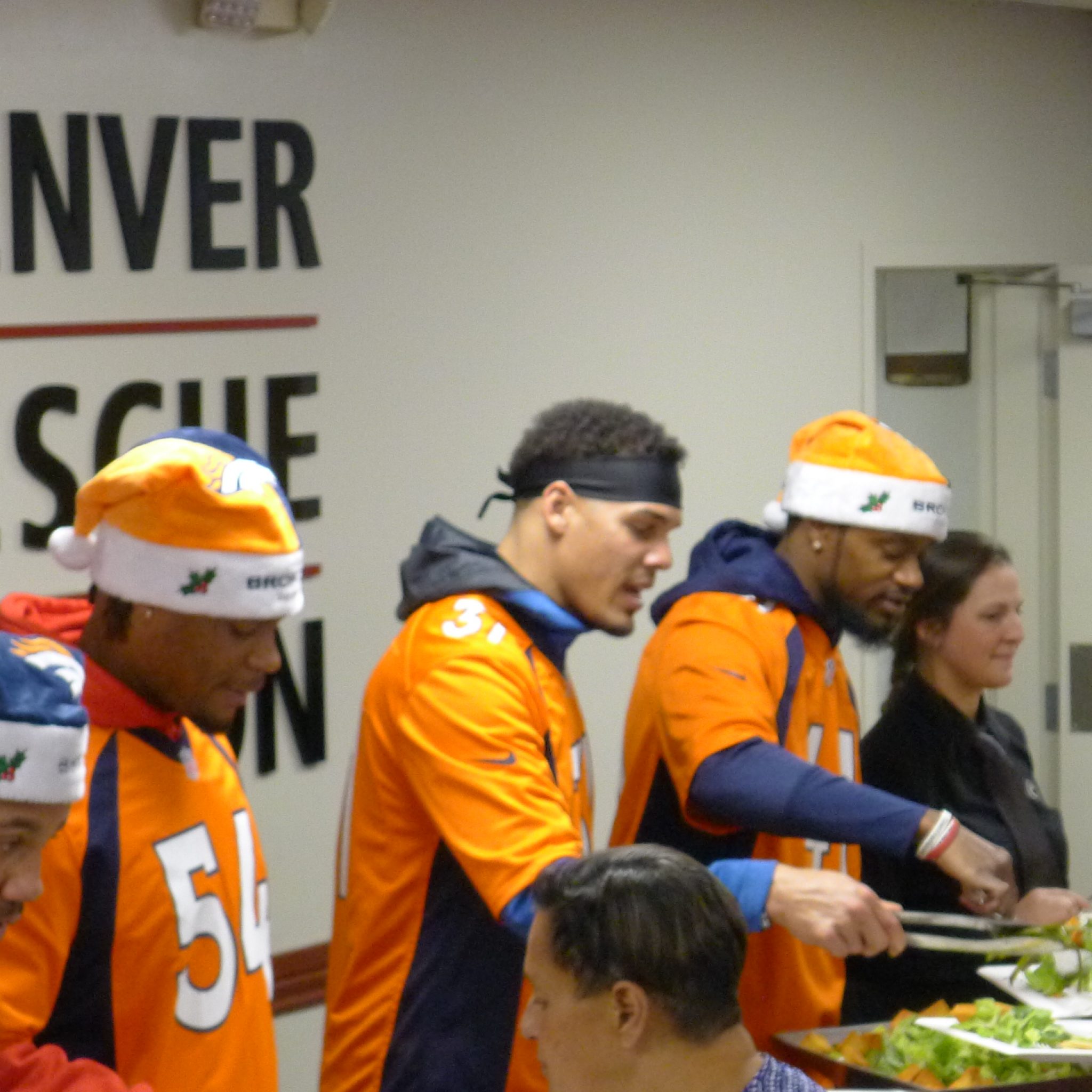 Every year Broncos players serve guests a special holiday meal