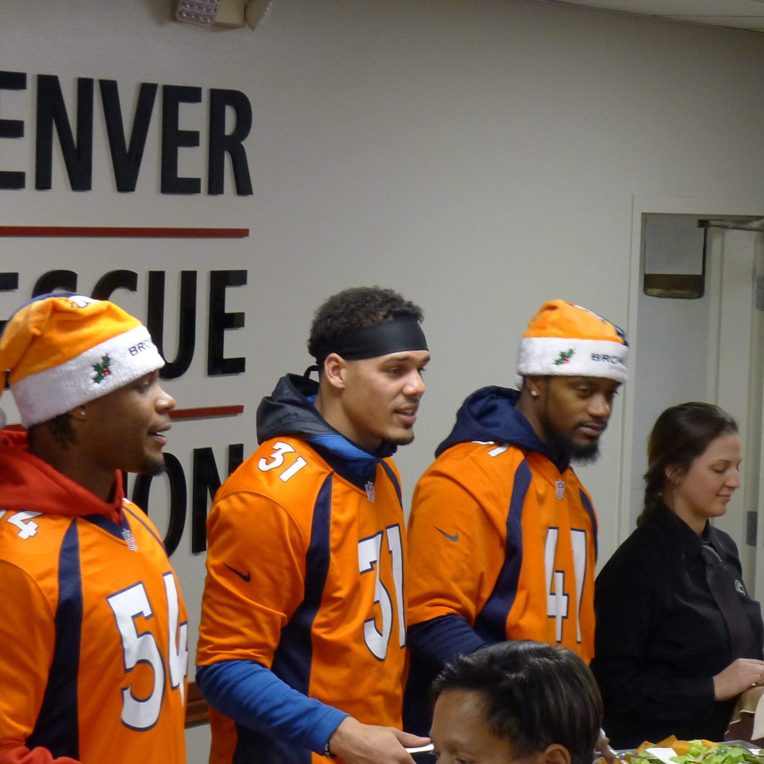 Every year Broncos players serve guests a special holiday meal