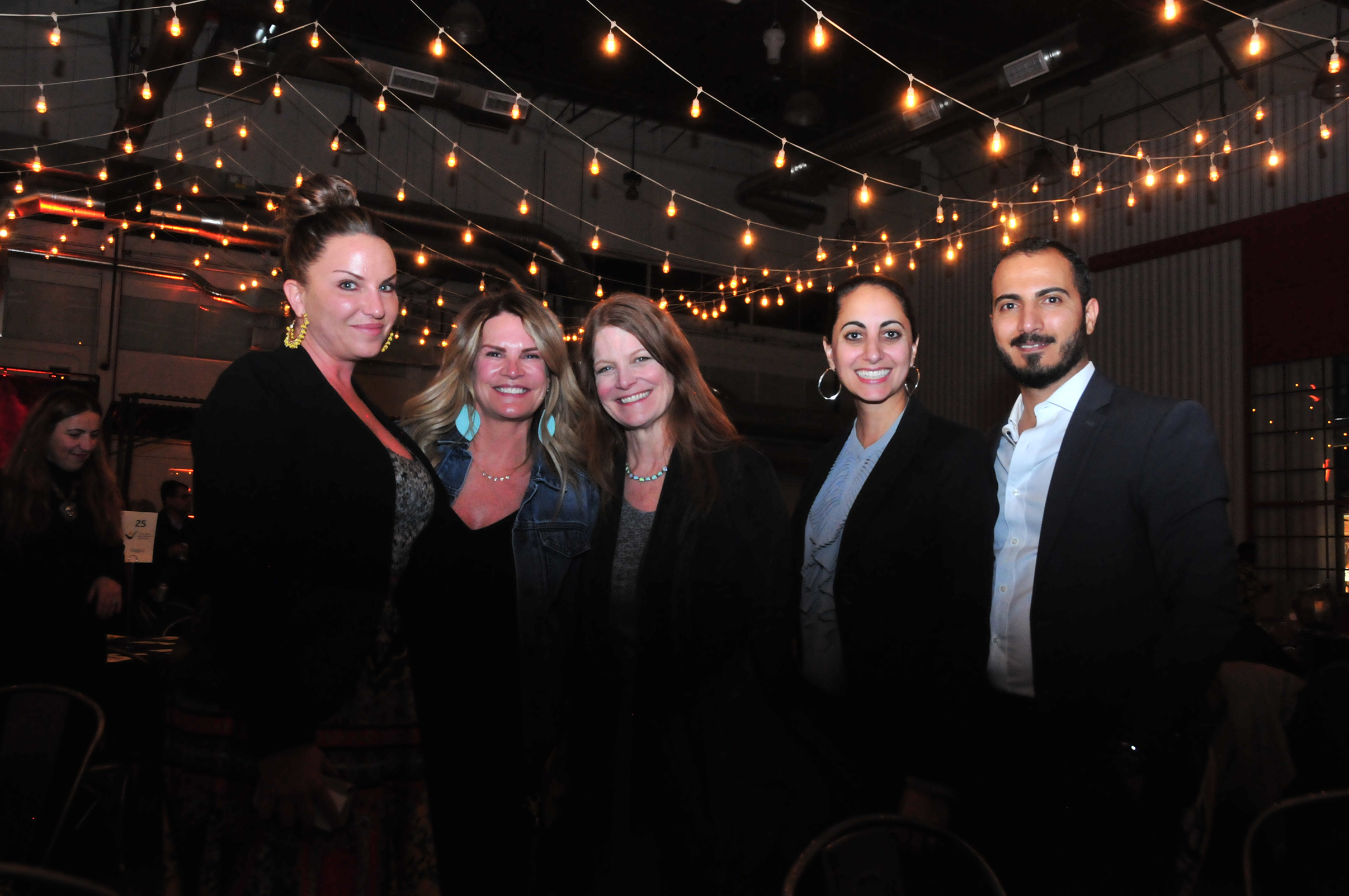 Village Exchange Center Executive Director Amanda Blaurock (left) with ...