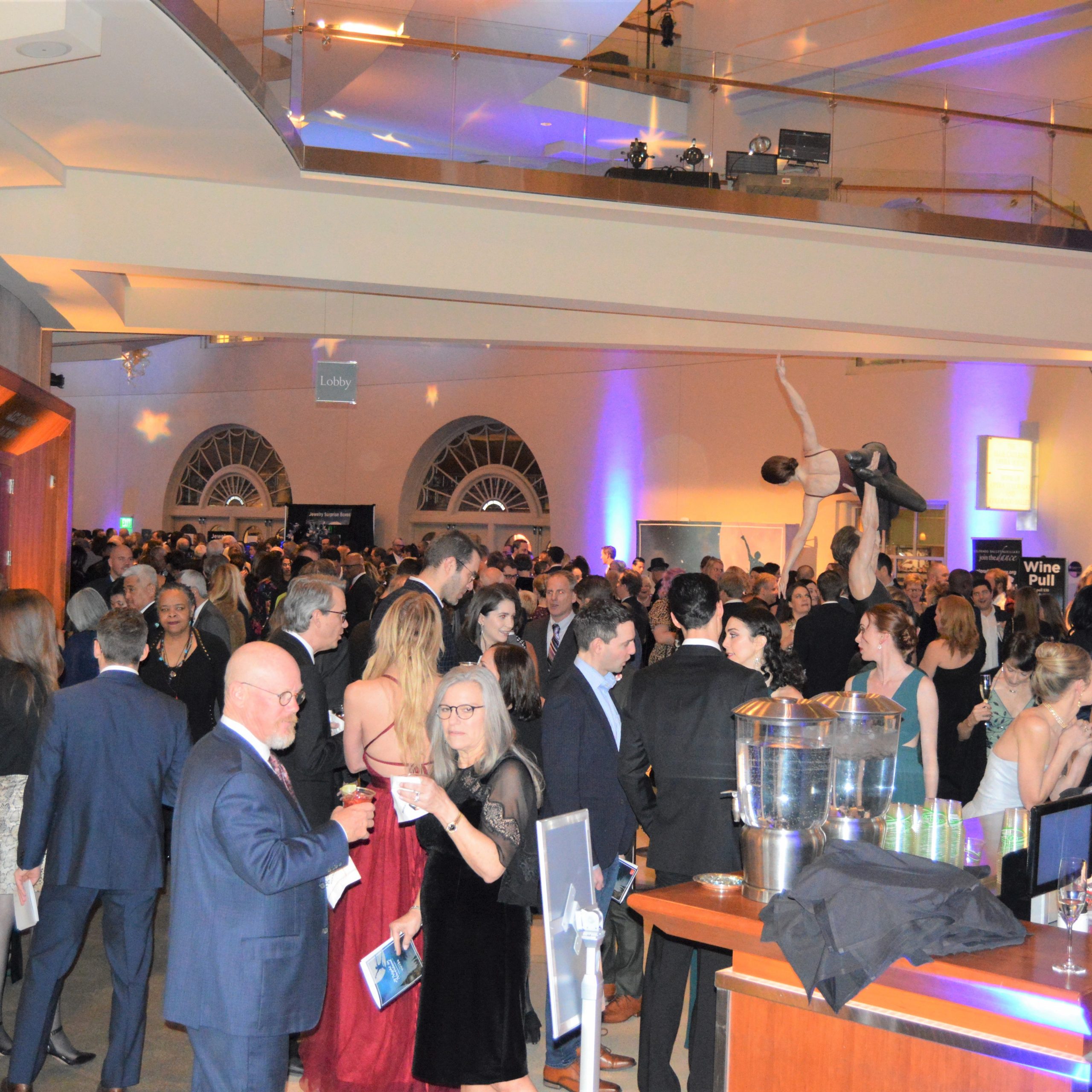 The reception crowd grows larger.