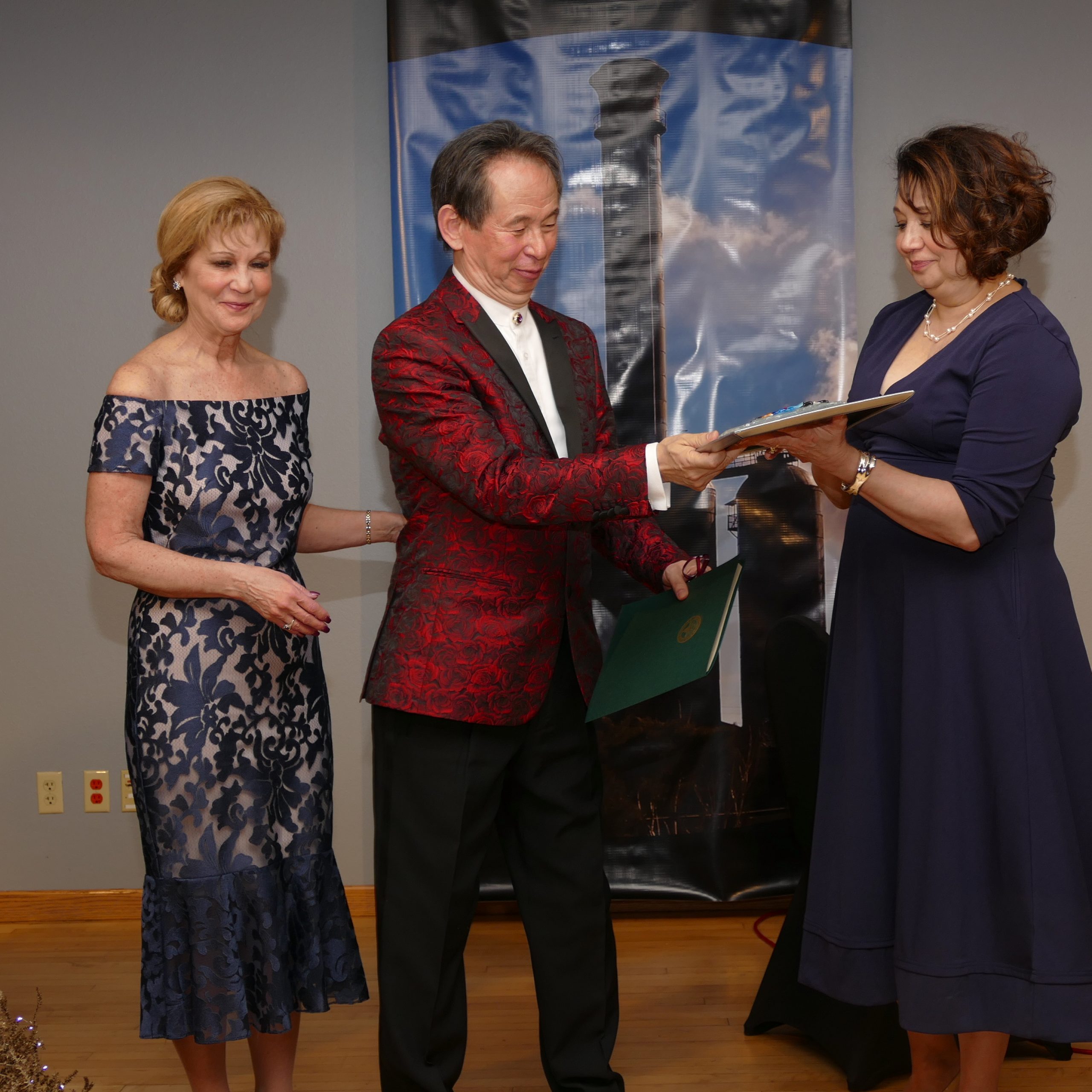 Dr. Patty Erjavec, left, and Theresa Dudley present the HOF award to Dr ...