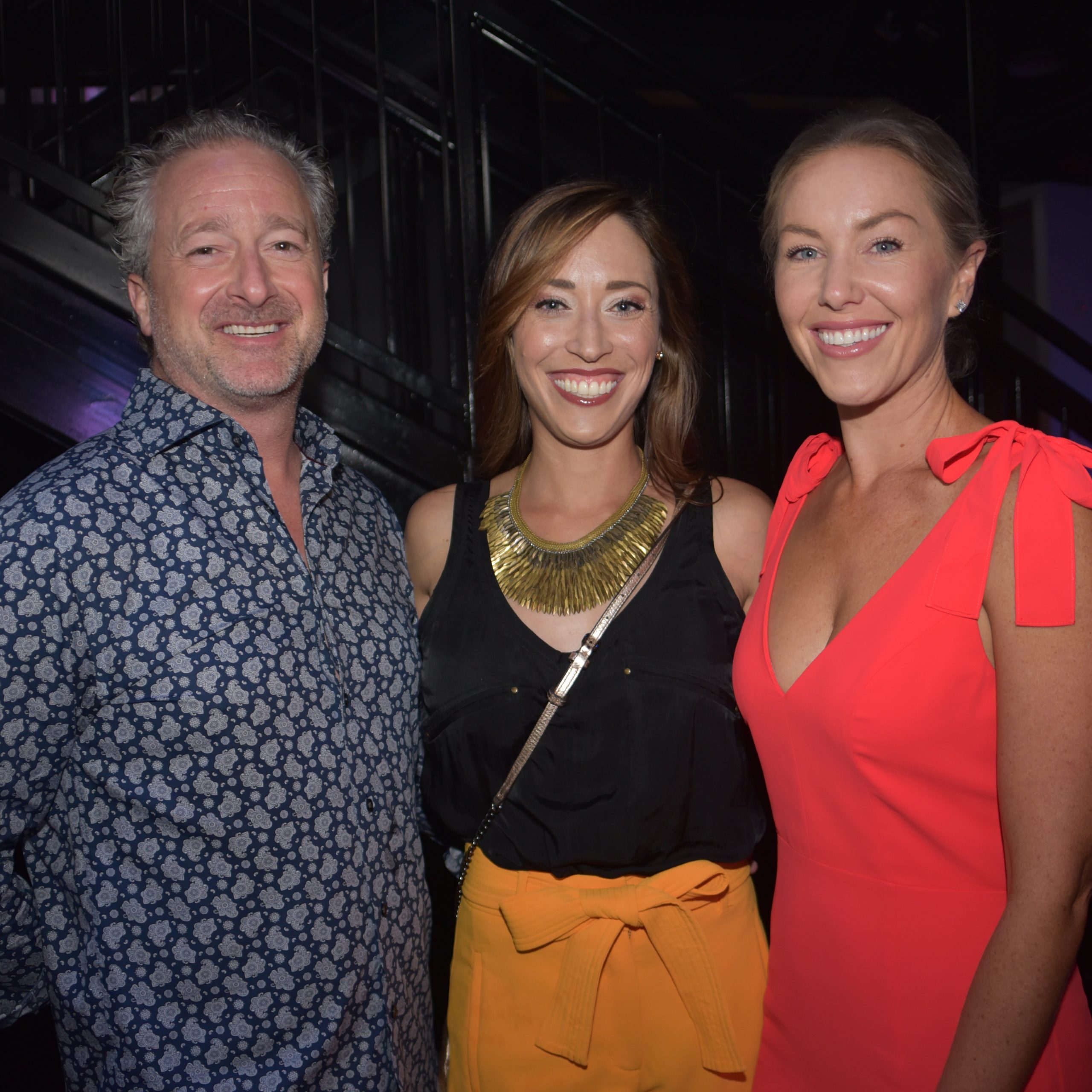 Kyle and Britany Chism, left, with co-host Sarah McCarthy