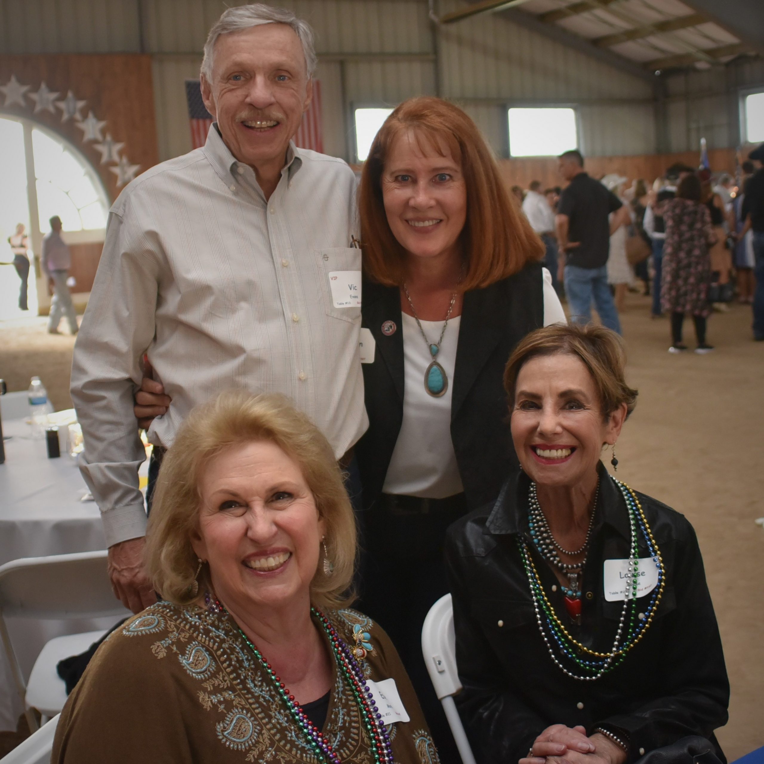 Seated: Edie Marks, left, and Louise Rouse; in back: Dick and Sharon Evans