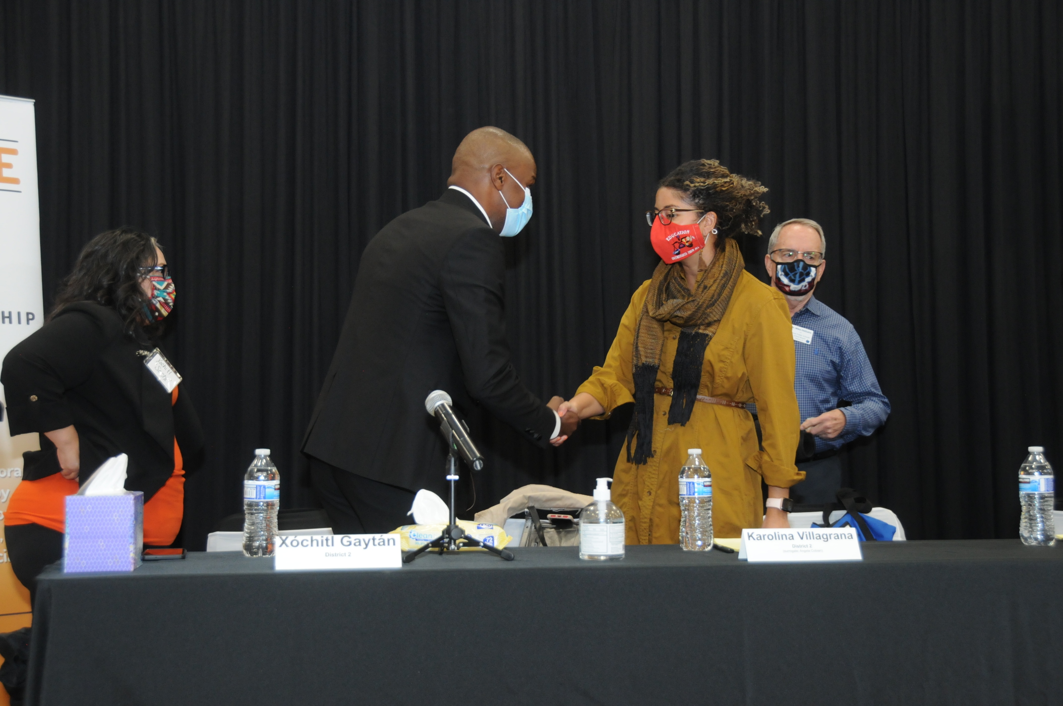 DPS School Board Candidates greet one another