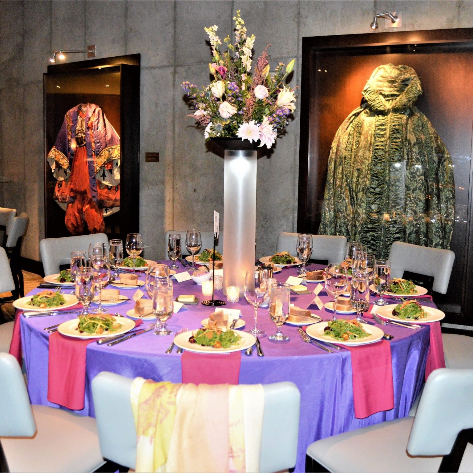 Tables are readied for a Kevin Taylor dinner here in the Chambers Grant ...