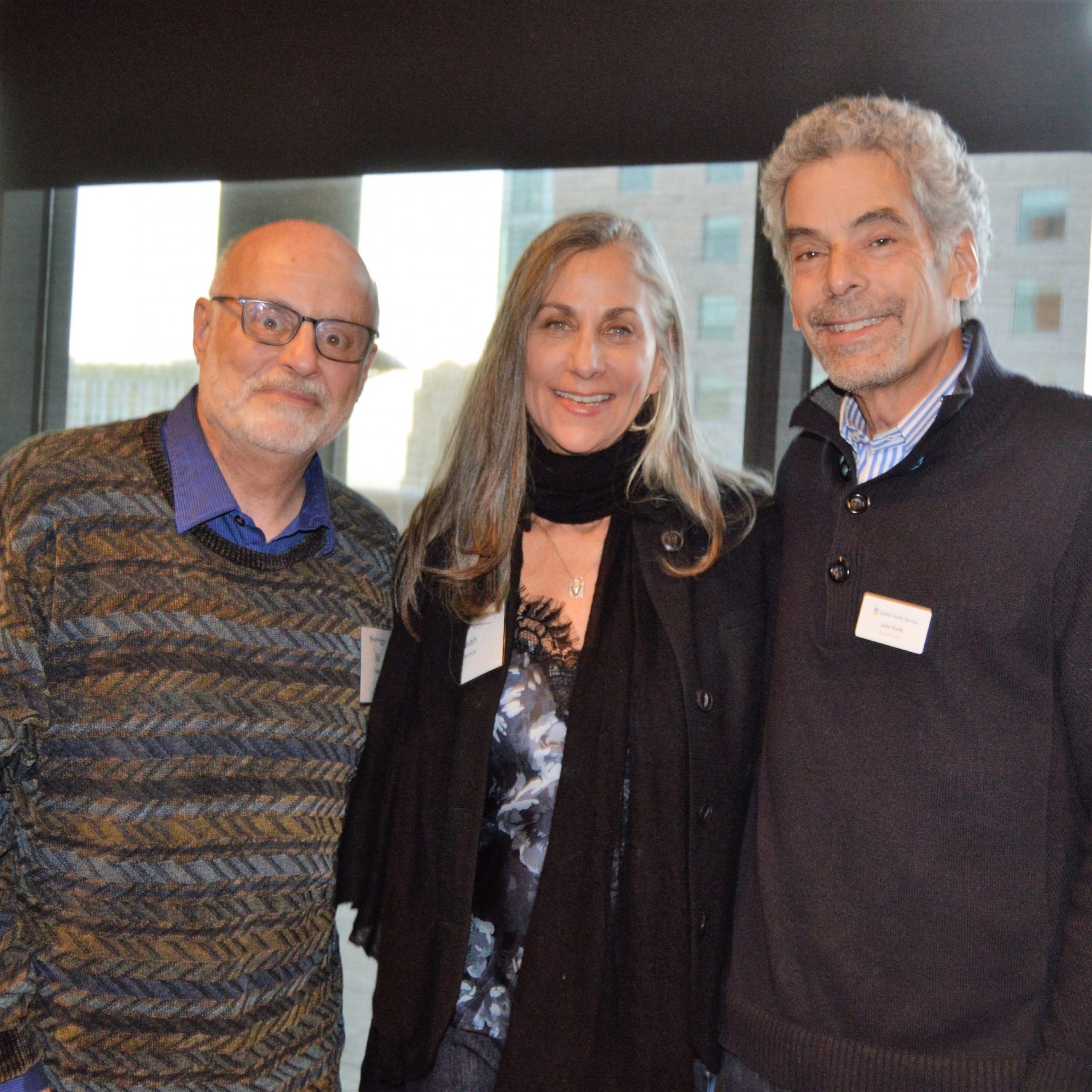 Bill Foster (left), Leah Weinkle and board member John Keith