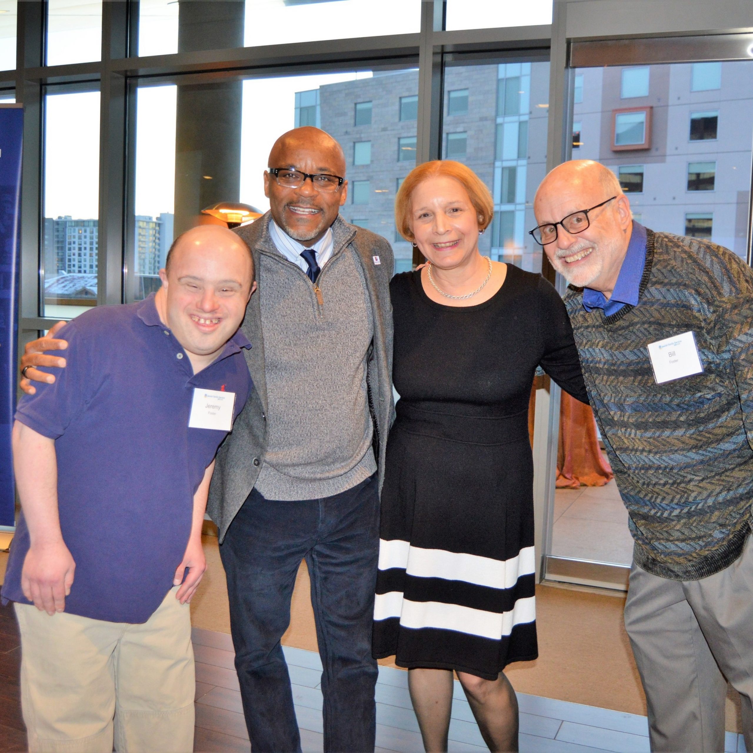 (l to r): Jeremy Foster, Denver Mayor Michael Hancock, JFS President ...