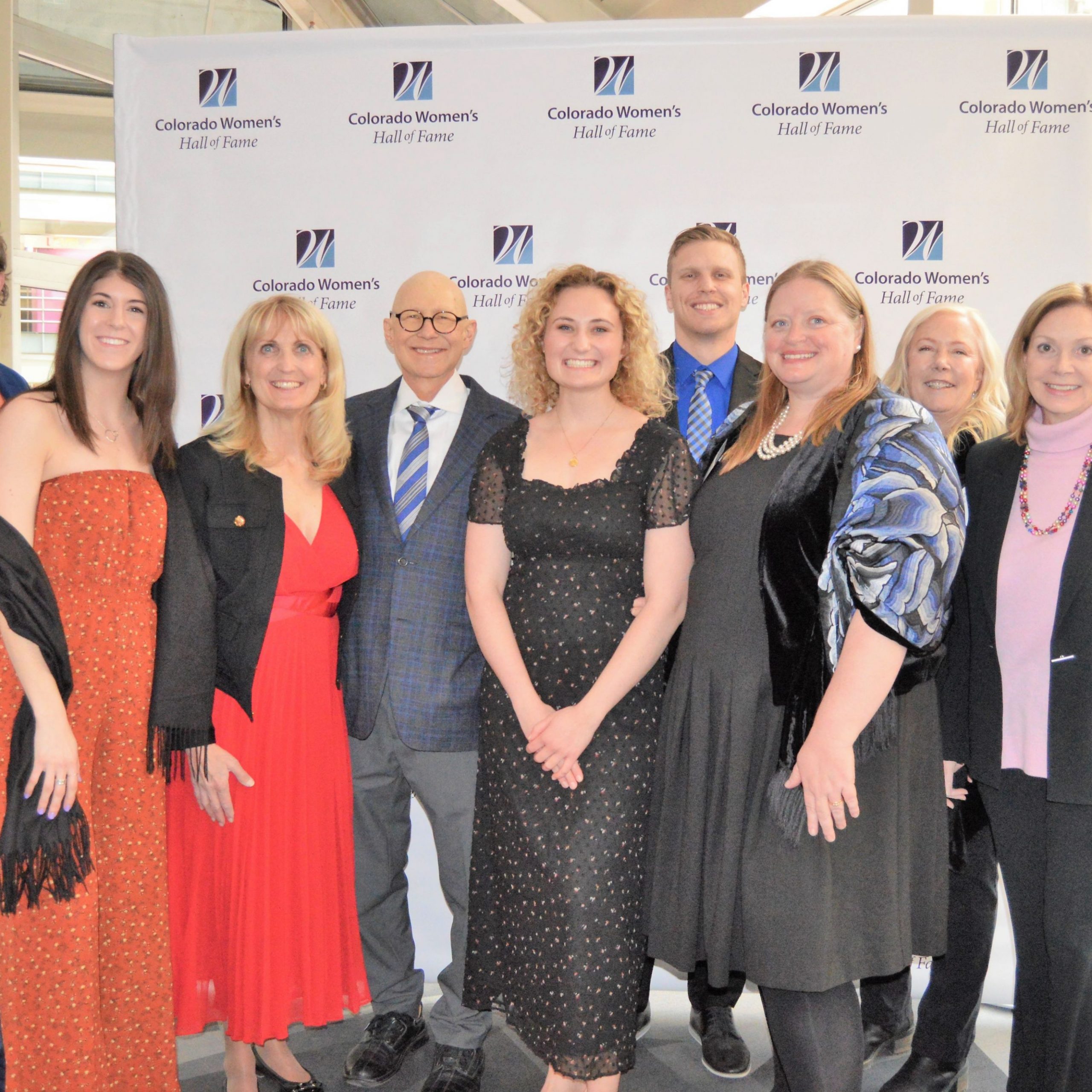 (l to r): Sam Theil, Carly Sorenson, board member Patti and David Theil ...