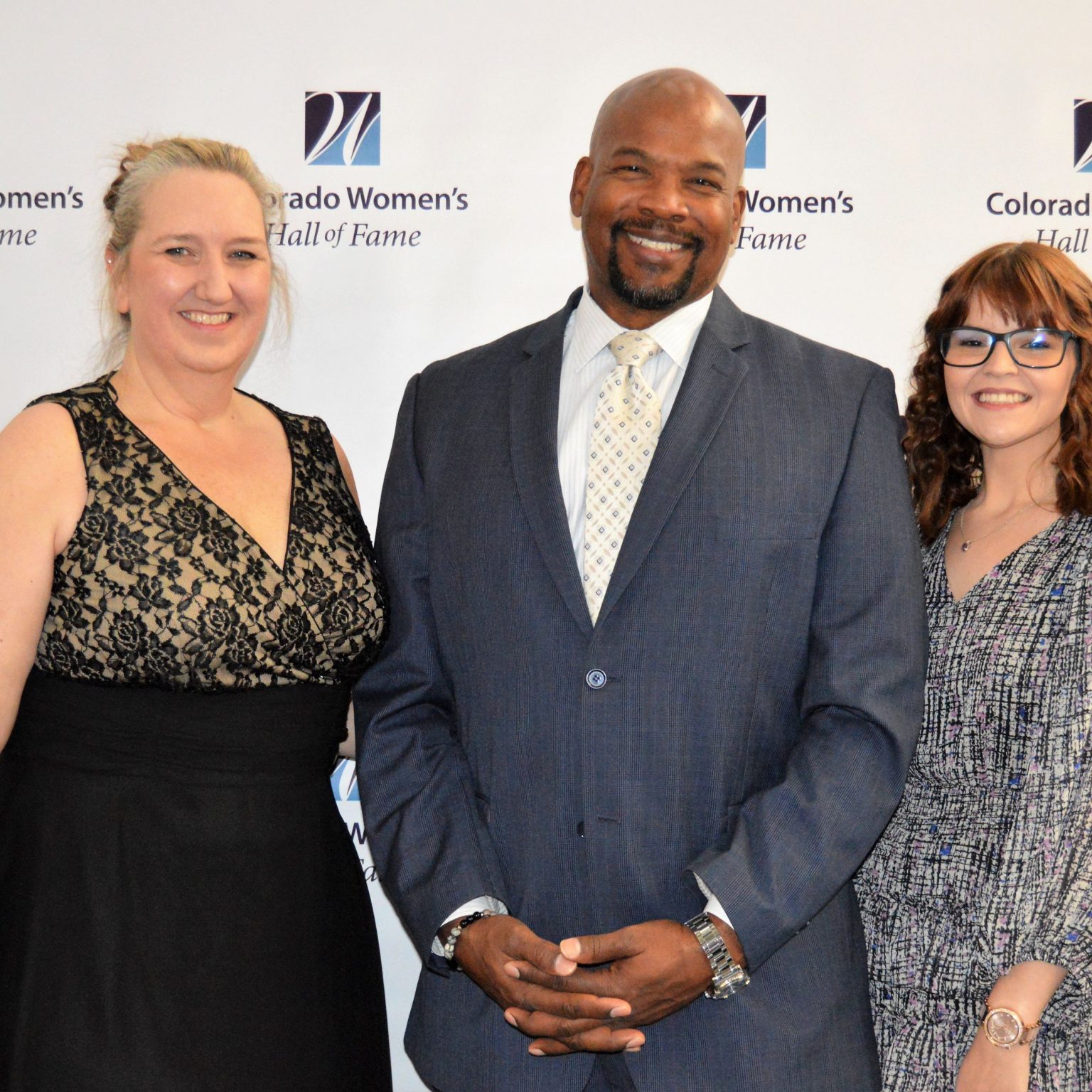 (l to r): Sam Theil, Carly Sorenson, board member Patti and David Theil ...